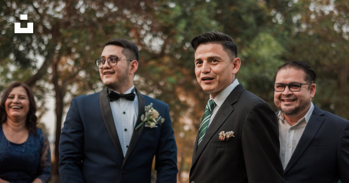 A Group Of Men Standing Next To Each Other Photo Free Woman Image On