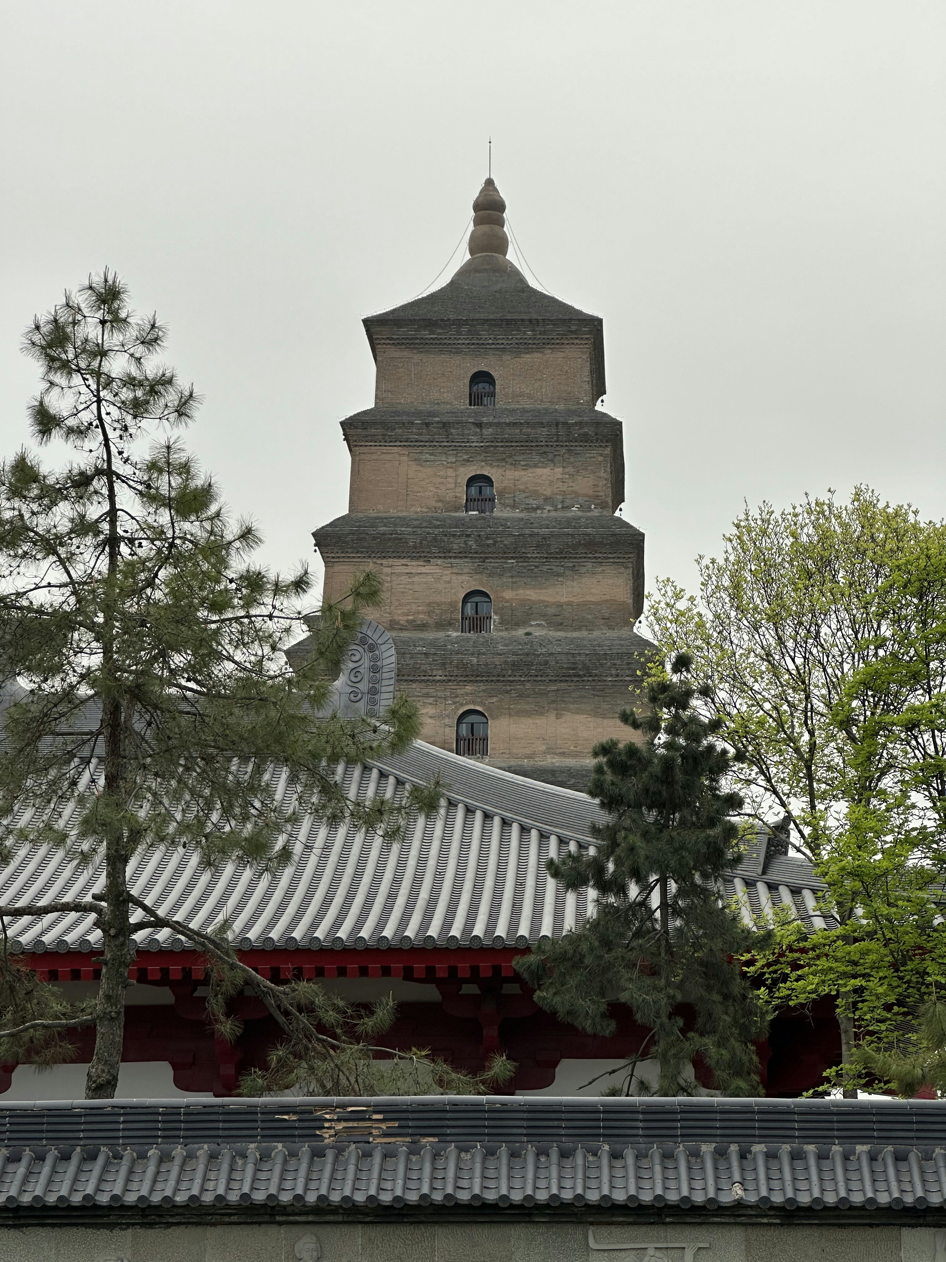 A tall tower with a clock on the top of it photo – Free Yanta district ...