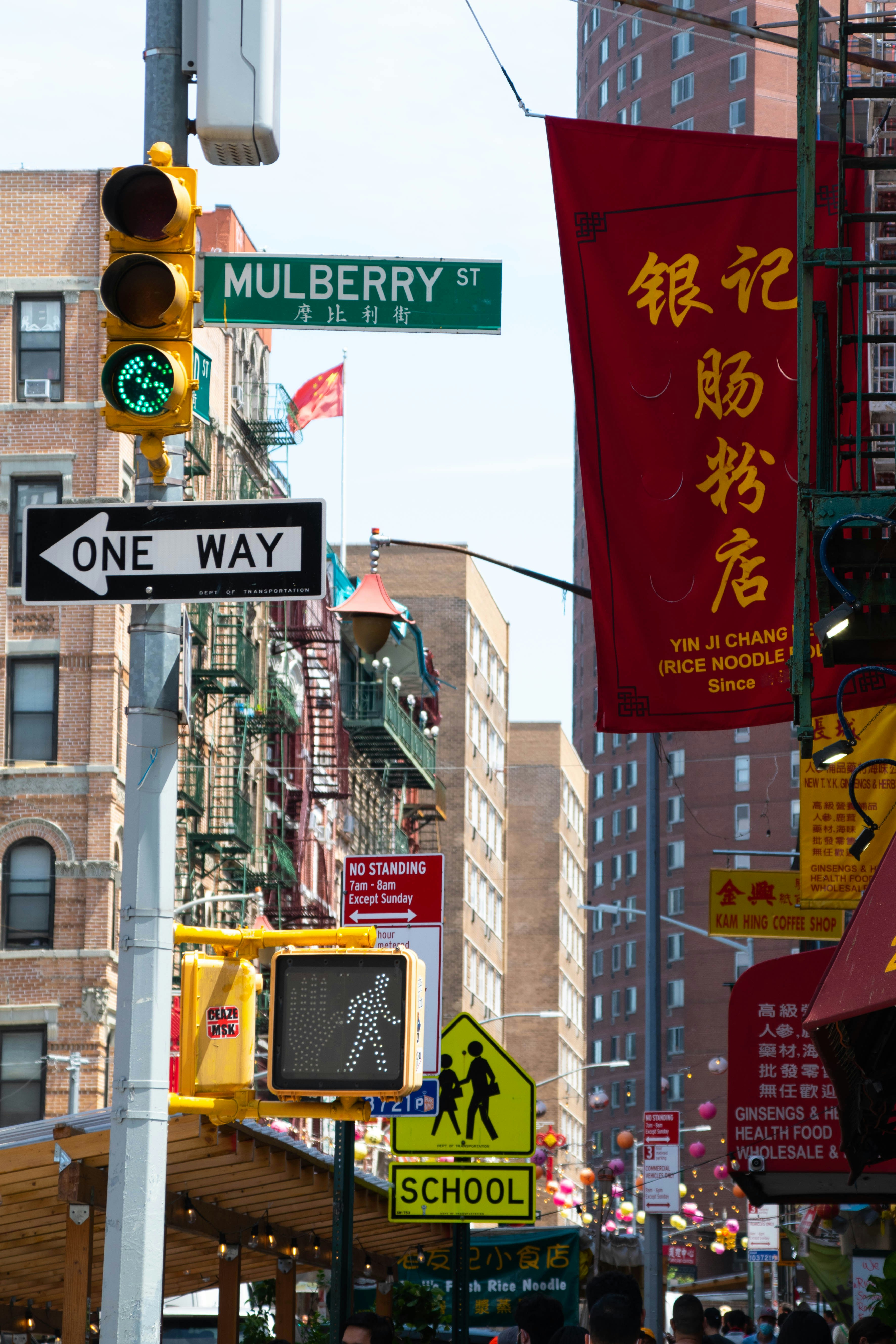 Mulberry Street Signal: Signs, Banners, and Pedestrian Rhythm in a Busy Chinatown Block