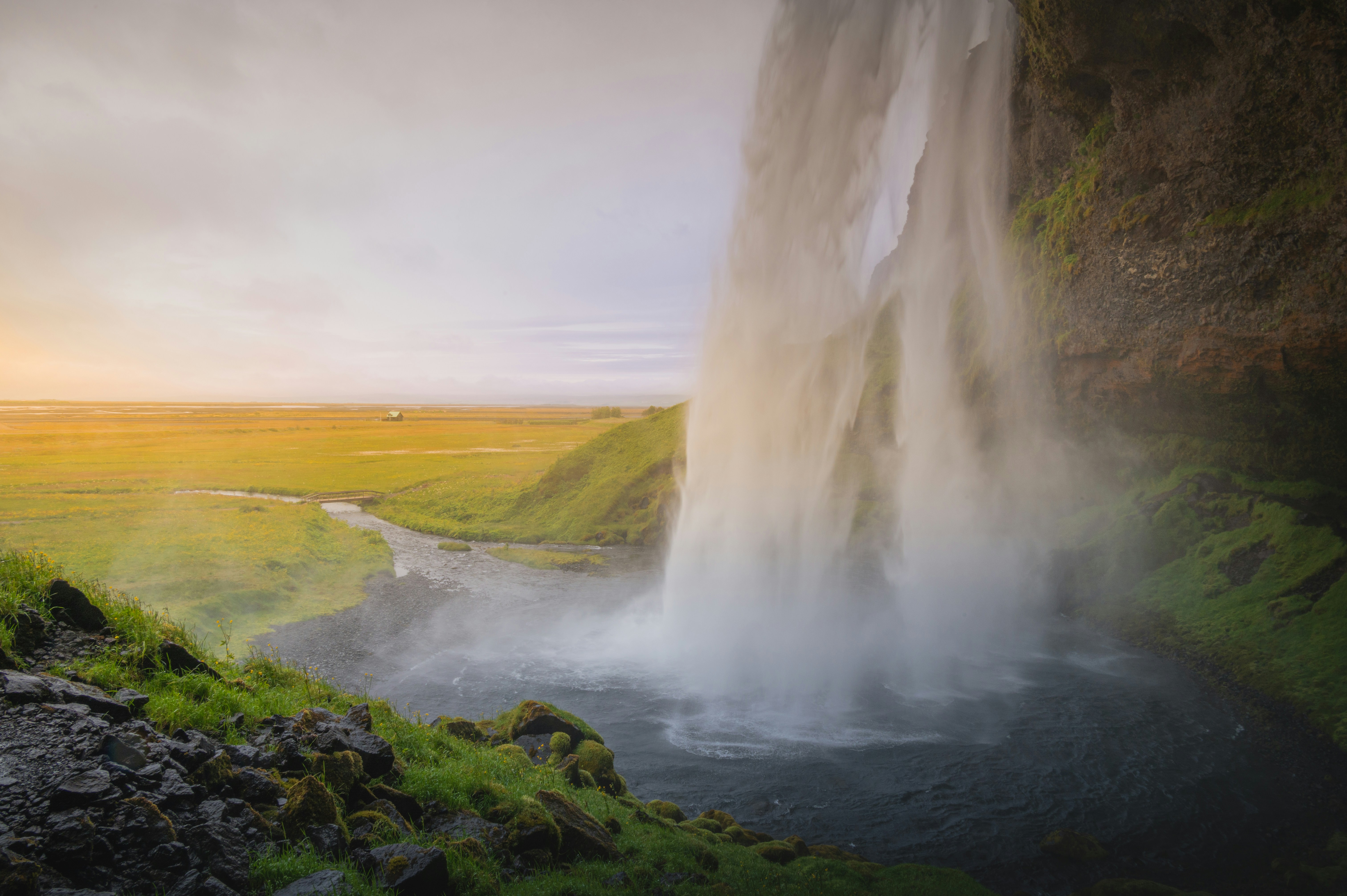 Dusk Veil Over a Moss-Covered Waterfall
