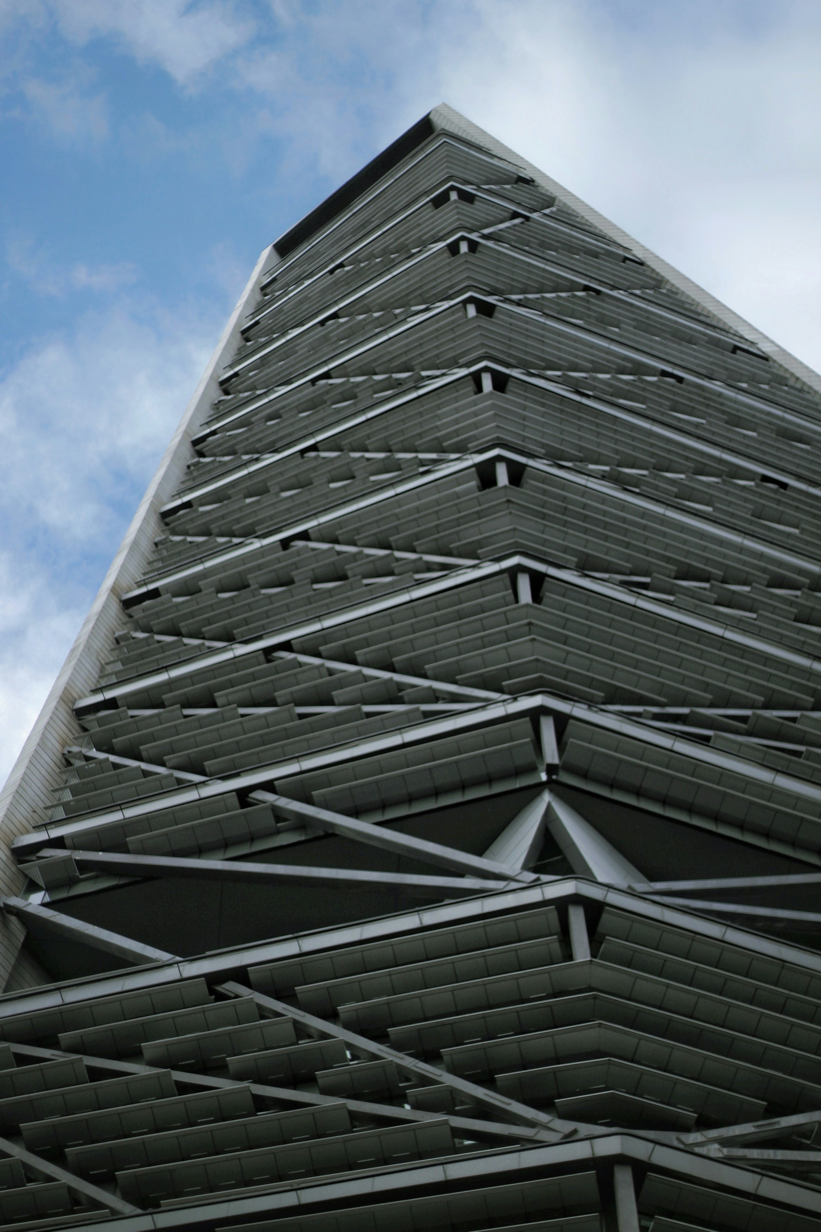 Convergence of Steel Steps: Skyward Facade