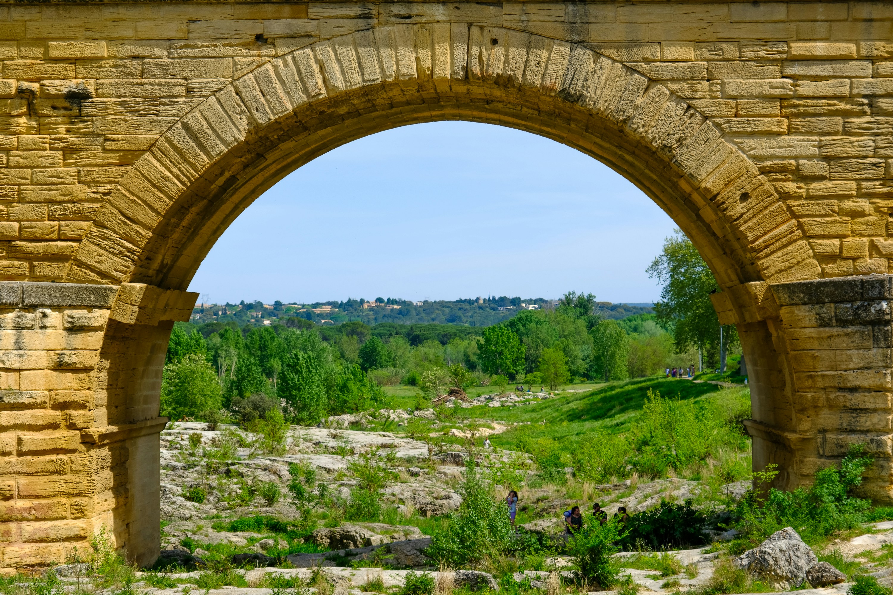 Stone Arch Portal Over a Verdant Valley