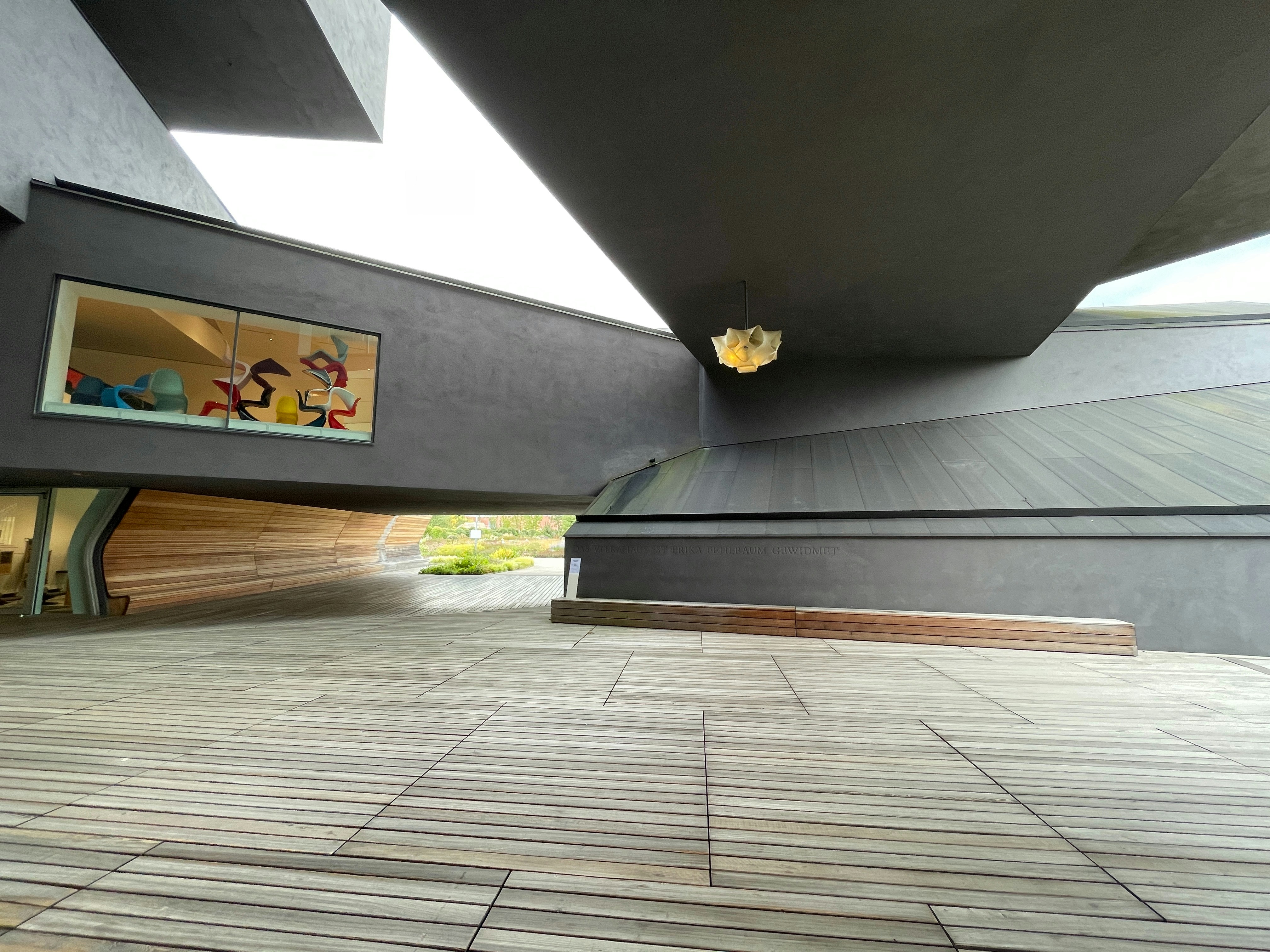 Floating Lamp in a Stark Geometric Atrium