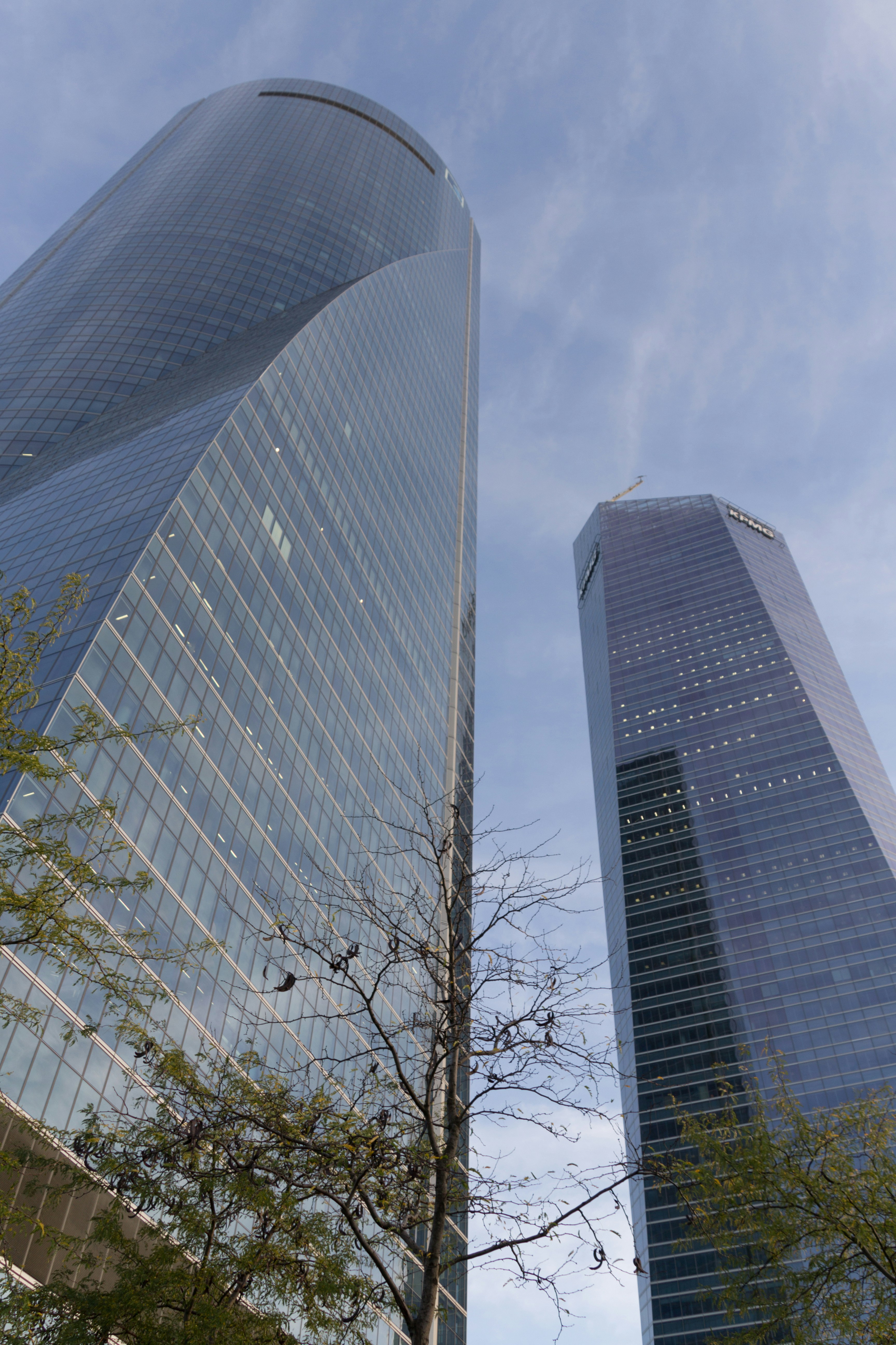 Two very tall buildings next to each other photo – Free Skyscraper ...