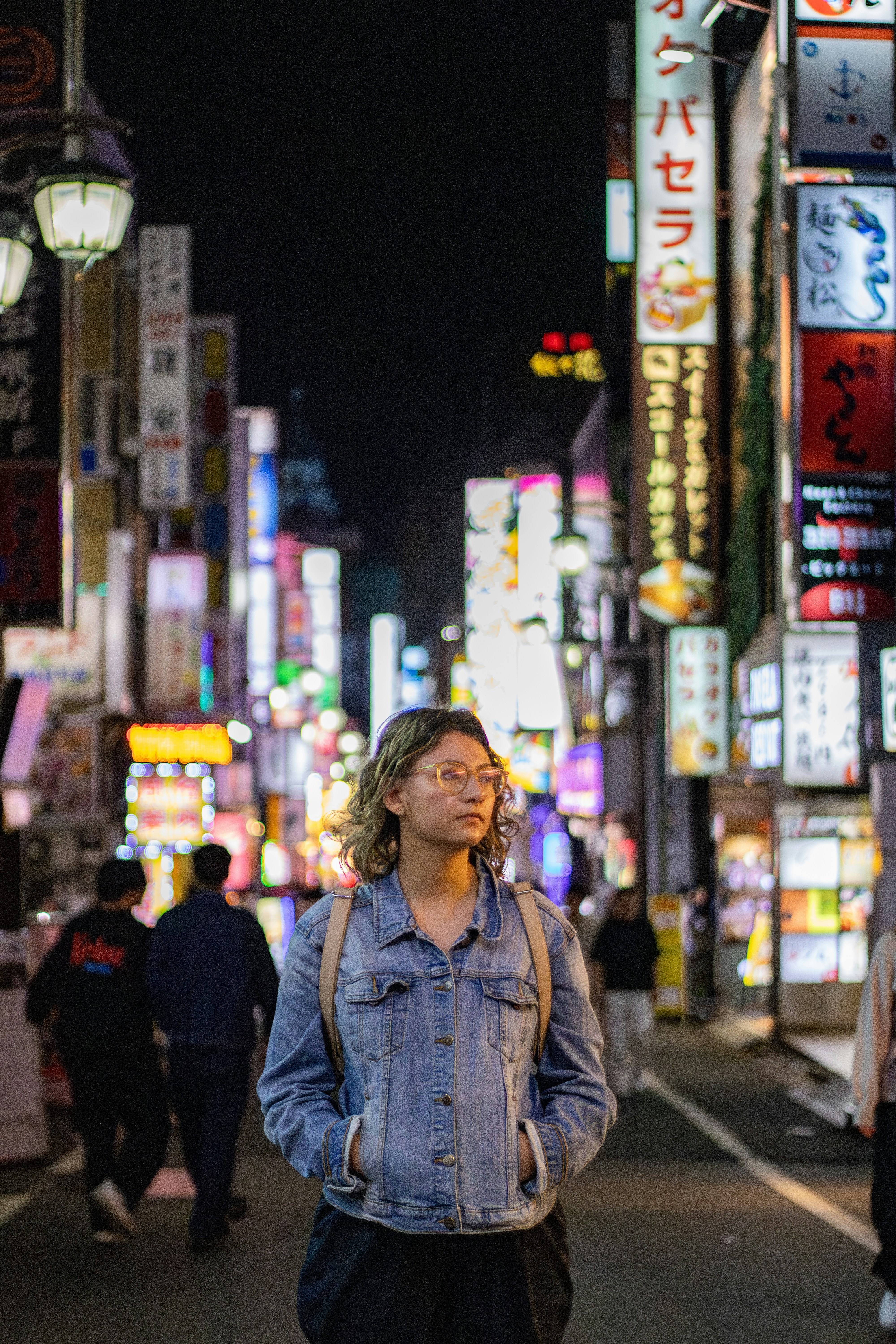 Neon Denim: A Quiet Portrait Under a Neon-Soaked Street