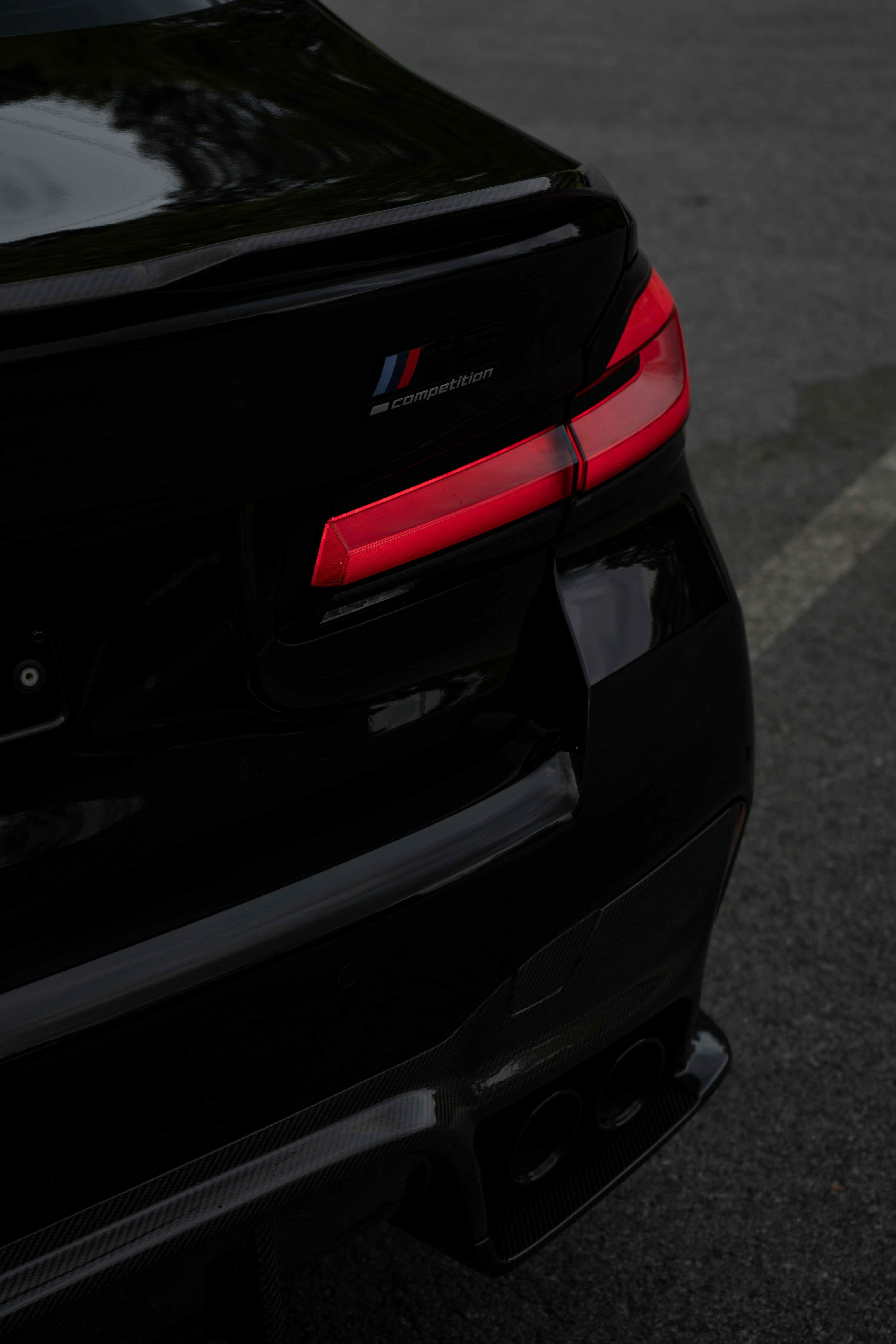 A close up of the rear end of a black car photo – Free Atlanta Image on ...