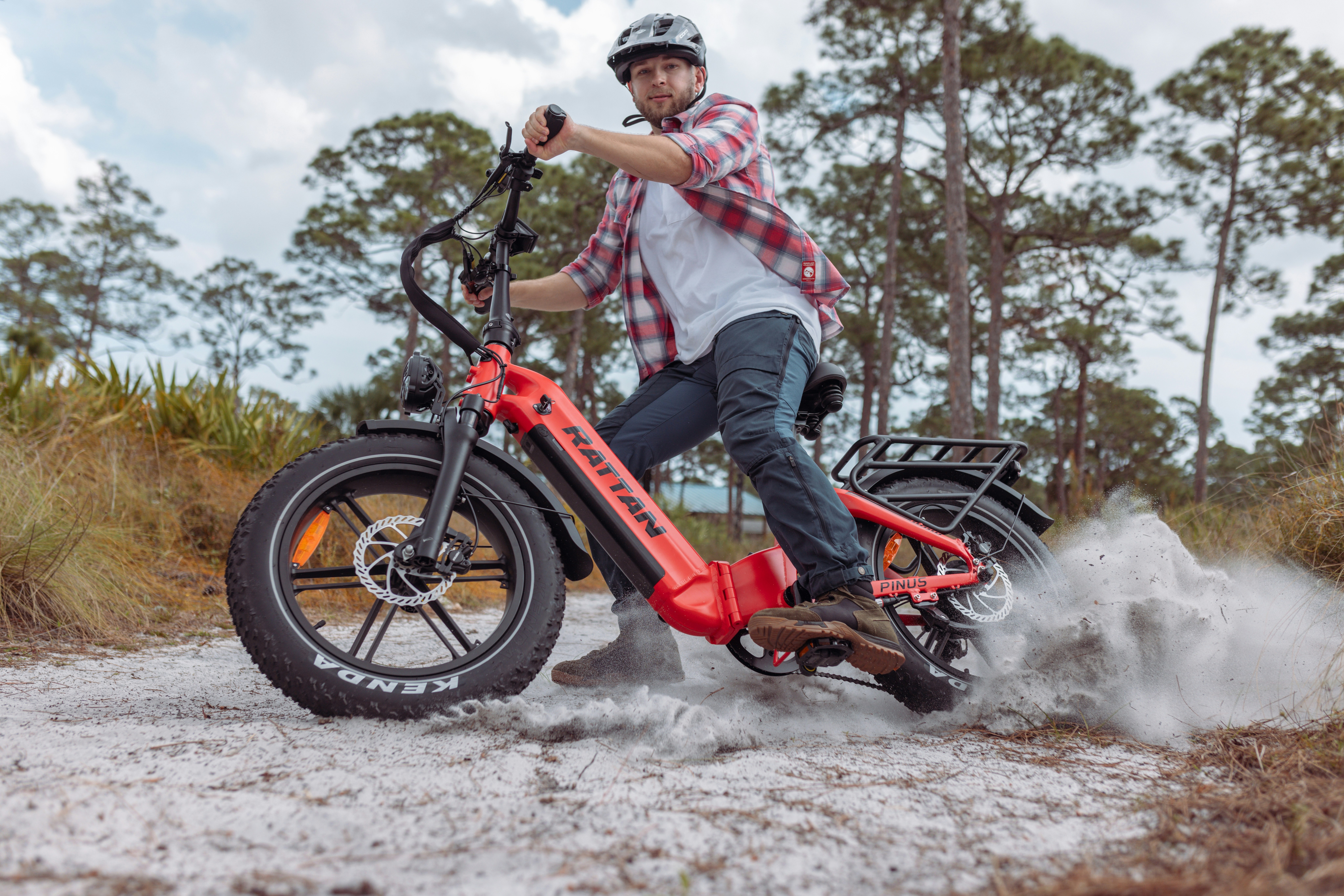 Crimson Drift: A Rider Powers Through Dust on a Red E-Bike