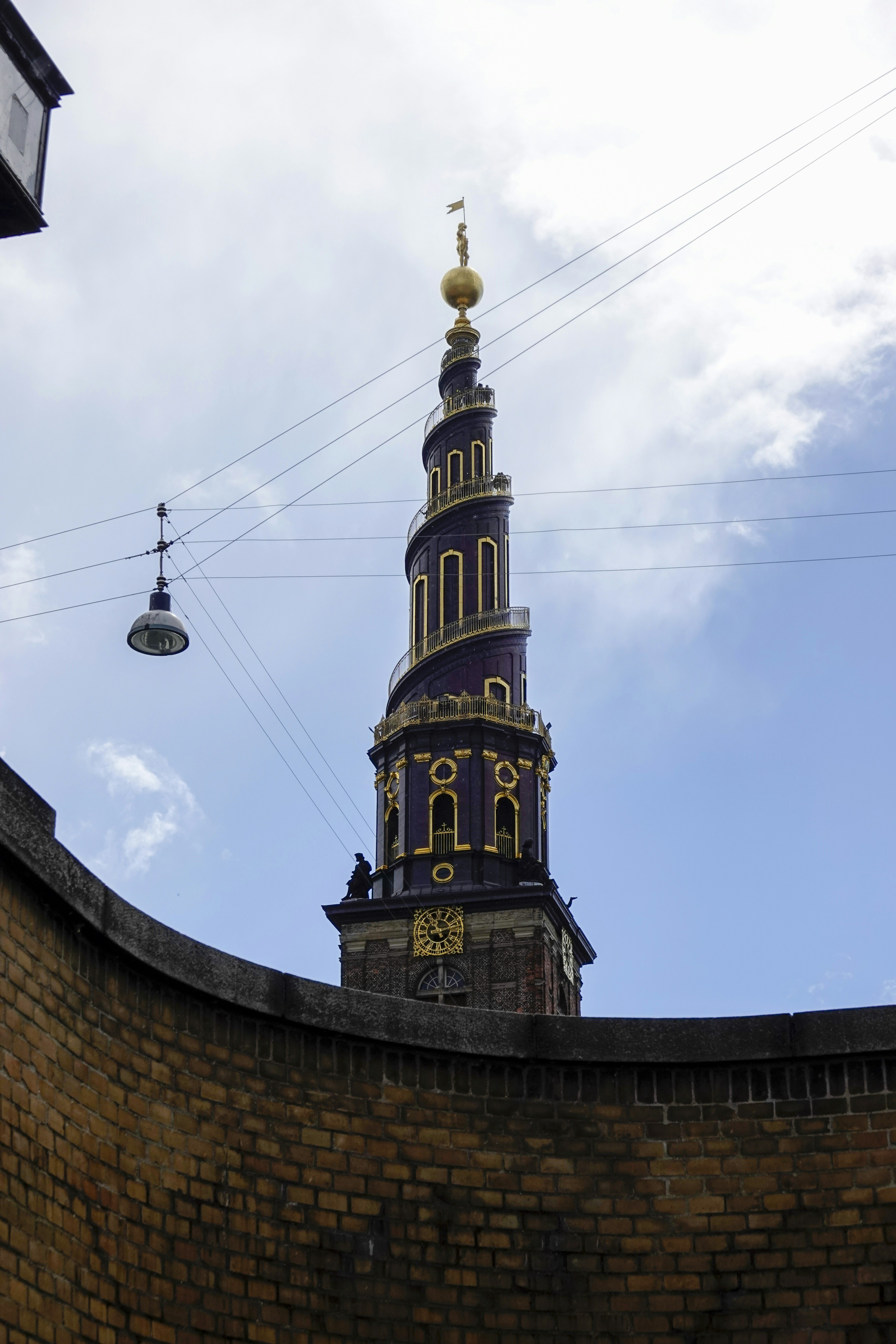 Spire in Focus: A Clocktower Reaches Toward the Sky