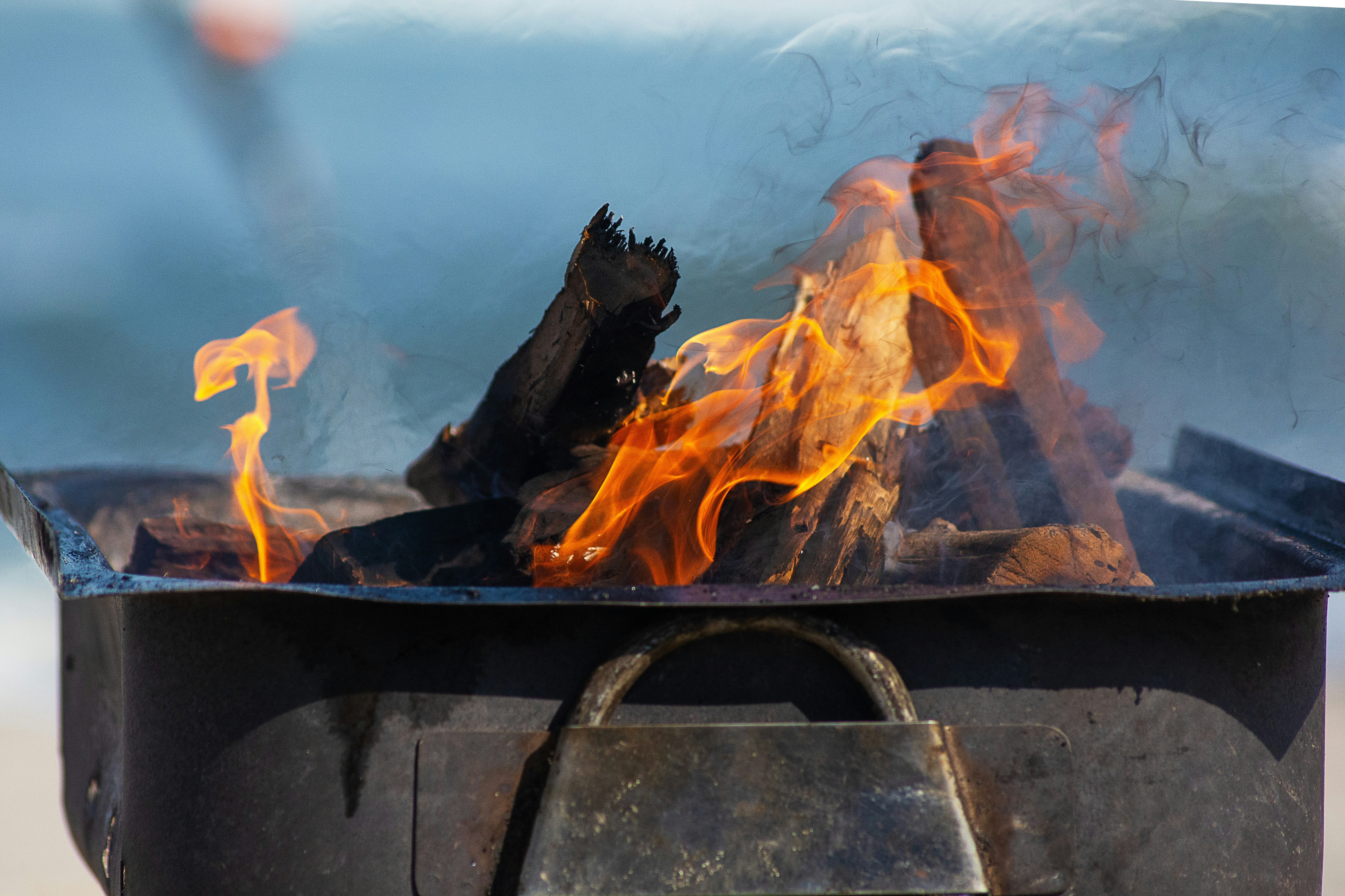 A close up of a fire in a grill photo – Free Fire Image on Unsplash