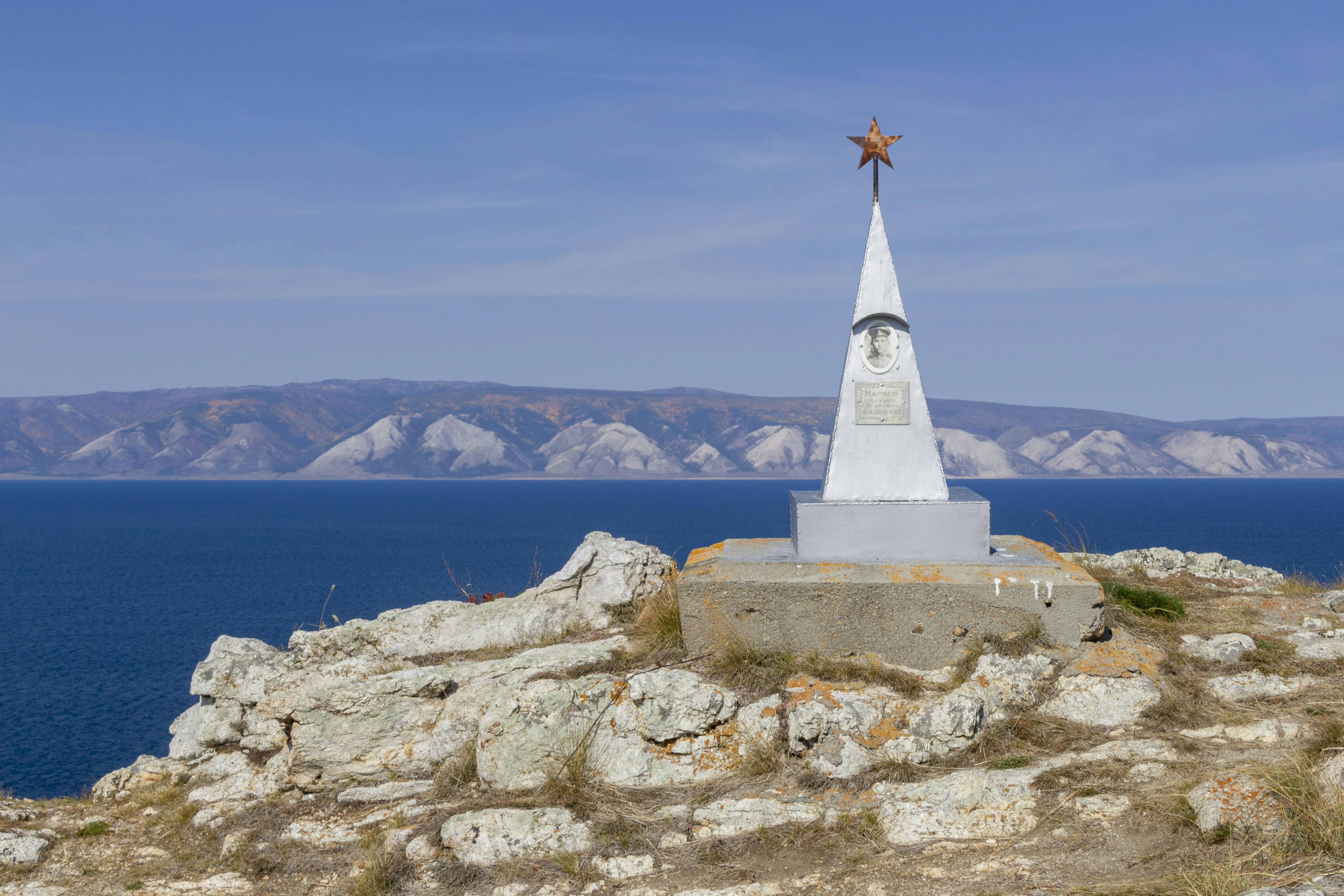 Star atop a windswept coastal memorial