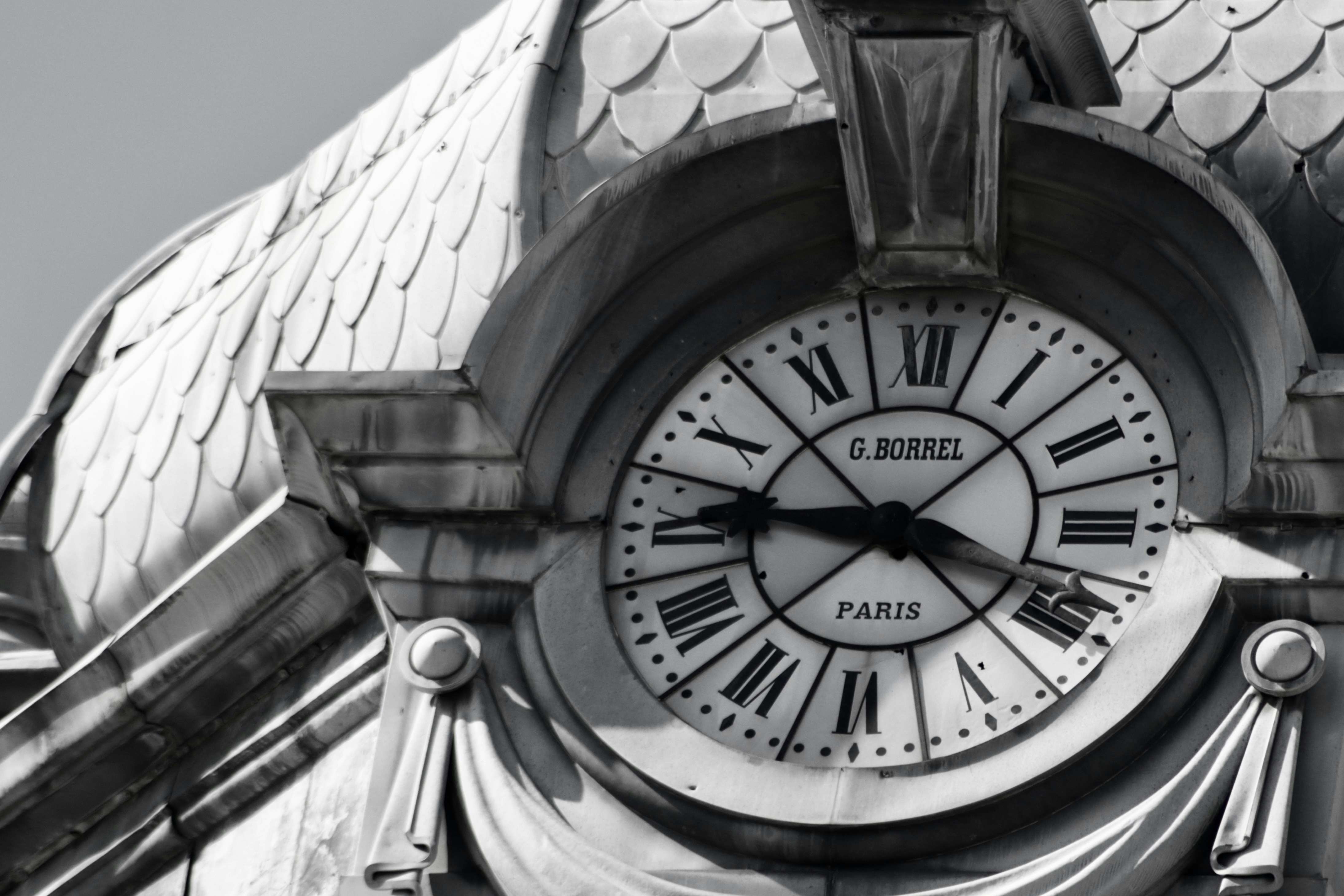 G. Borrel Clock on a Parisian Facade: Monochrome Time in Stone
