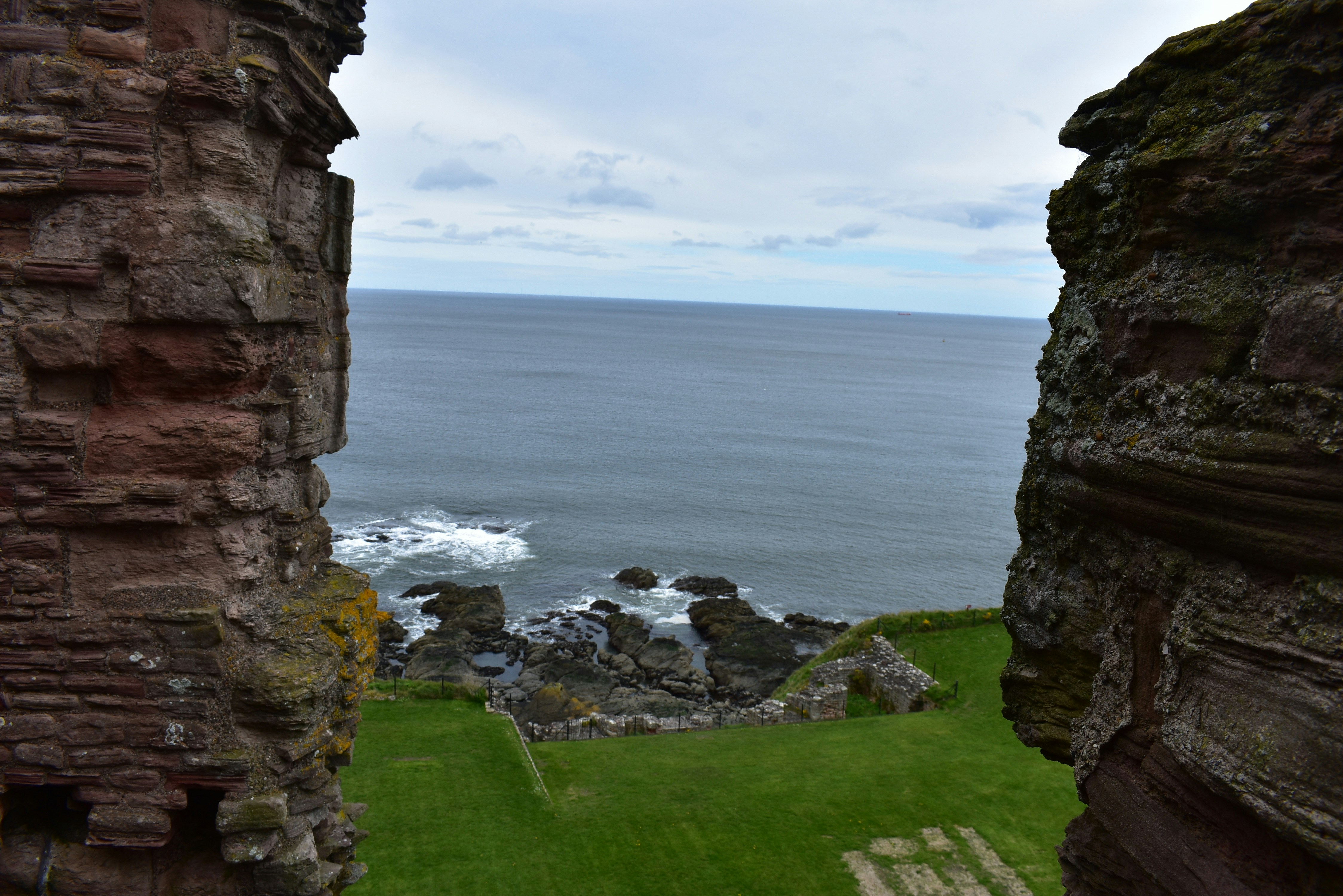 Ocean Vista Through Ancient Stonework