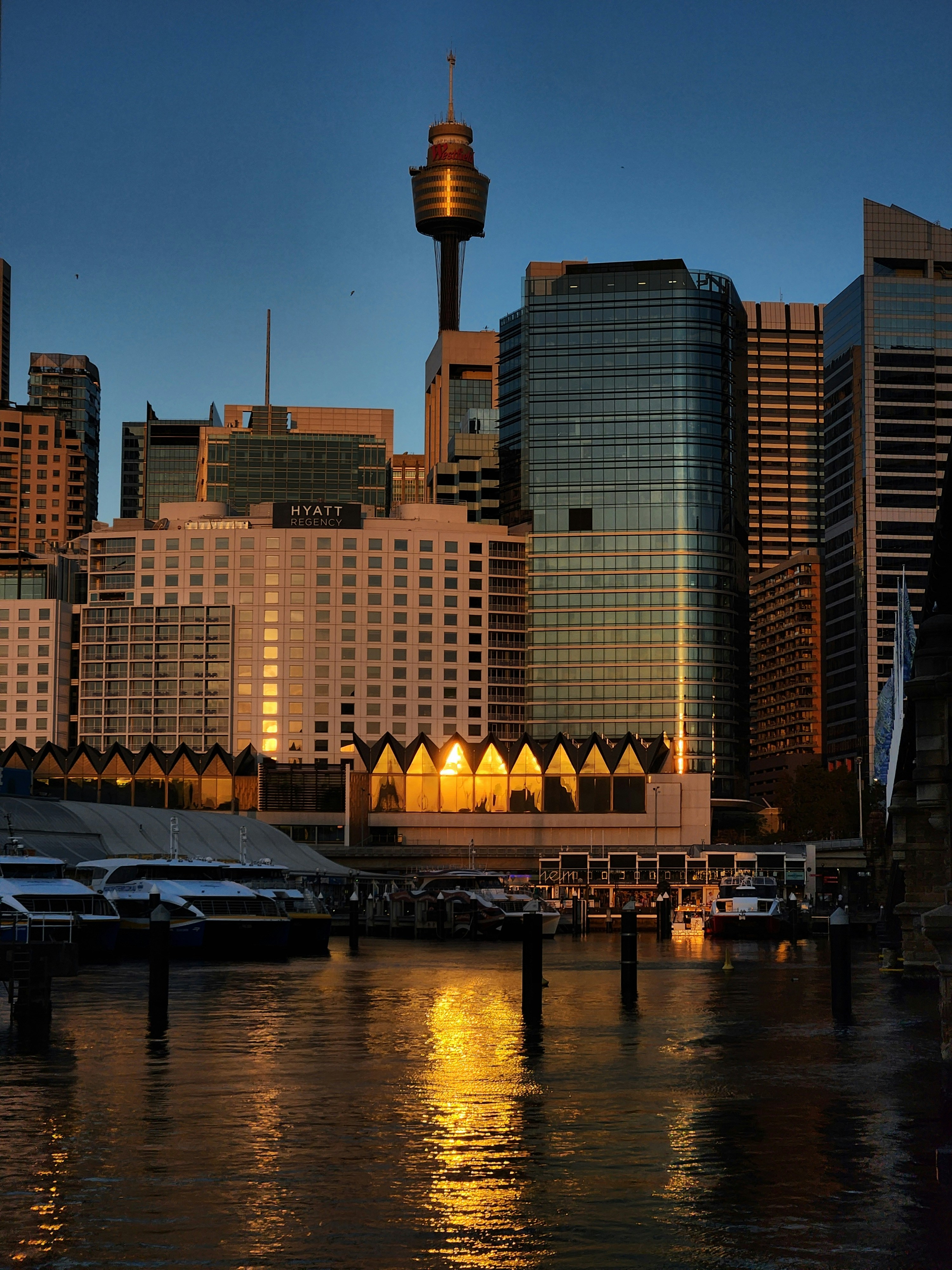 Golden Hour Echo: Waterfront Skyline and Tower