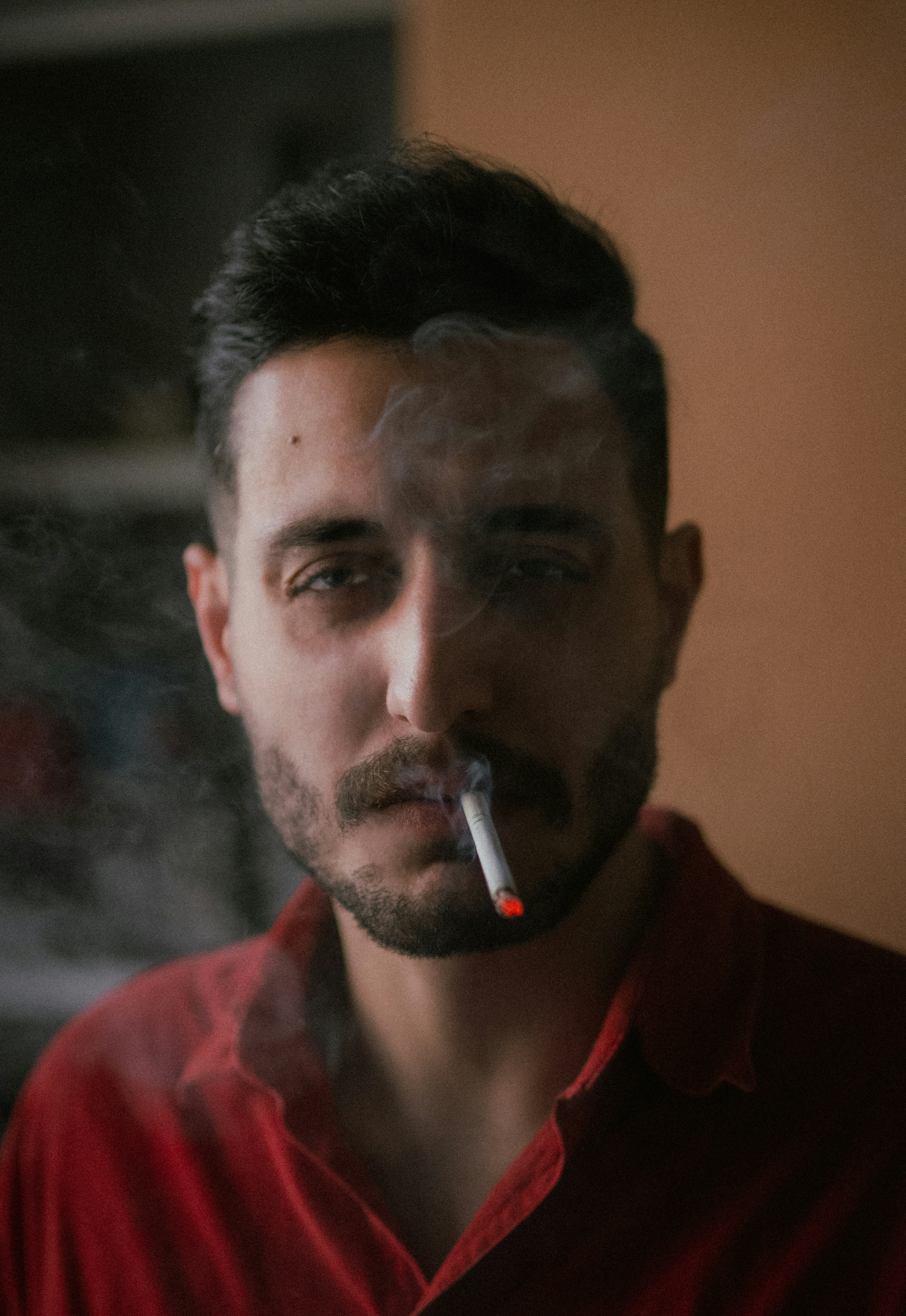 Ember Gaze: A Quiet Portrait in Smoke