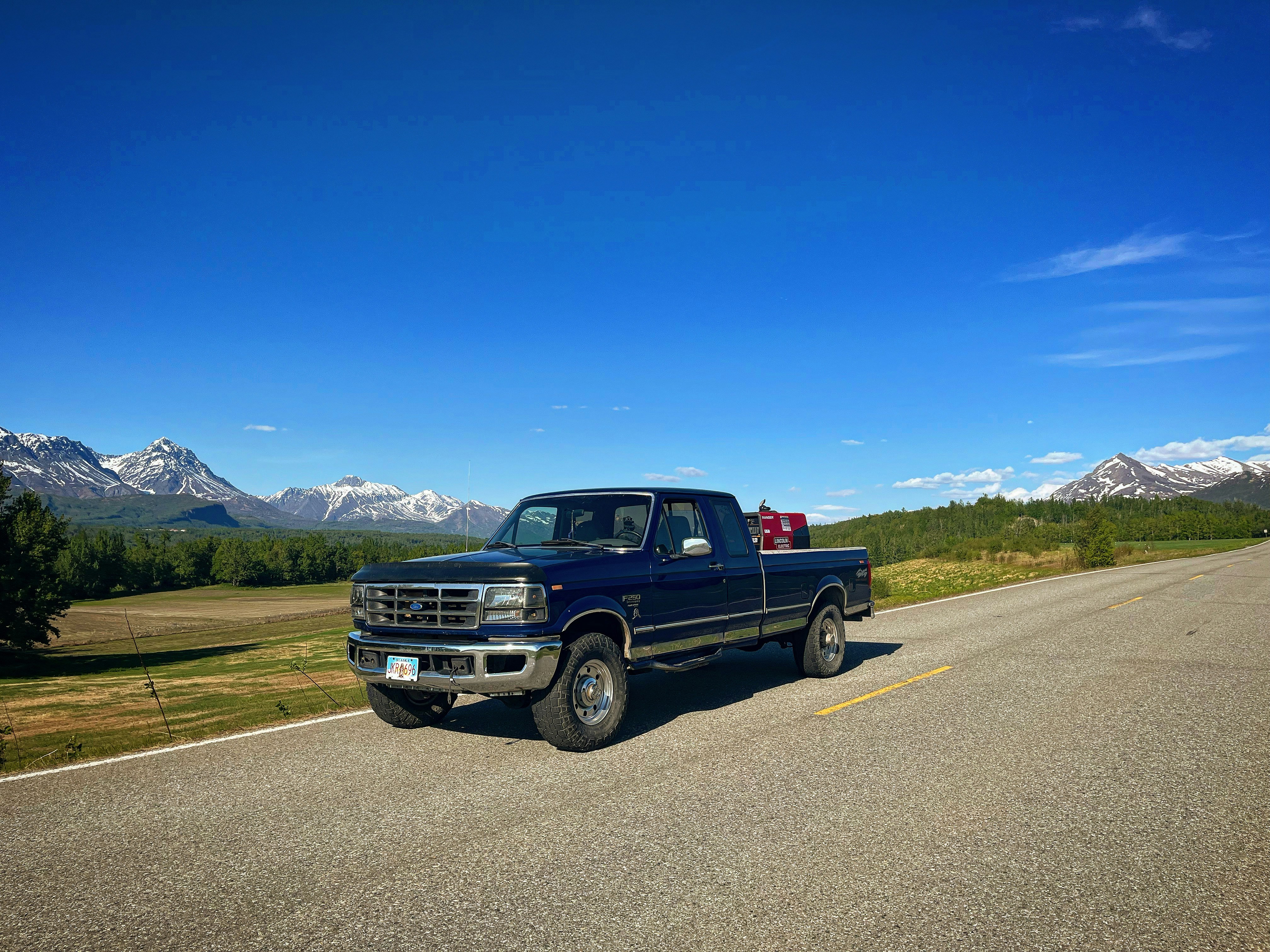 A pickup truck parked on the side of the road photo – Free Palmer Image ...