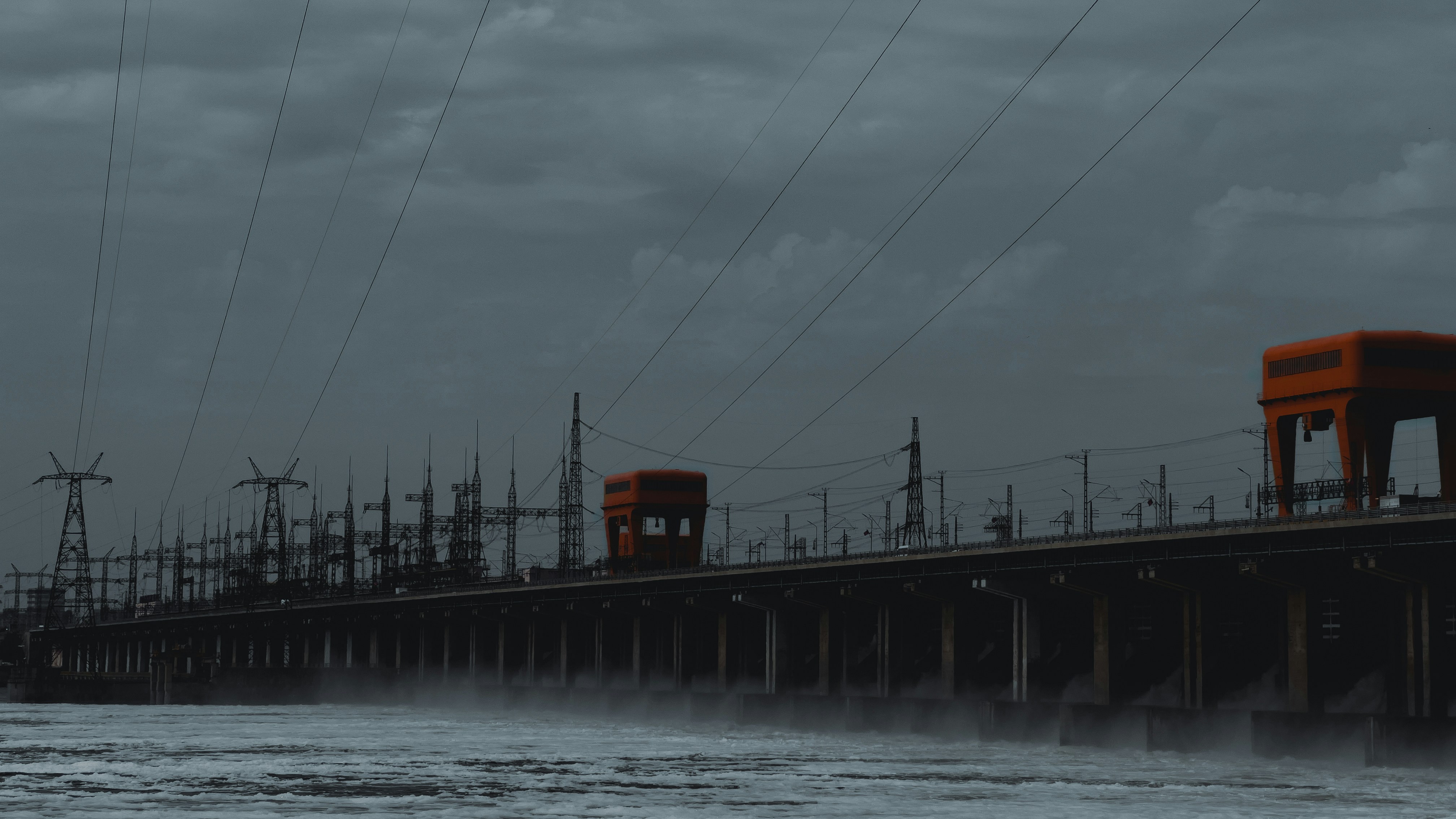 Industrial Silhouettes Against a Stormy Sky