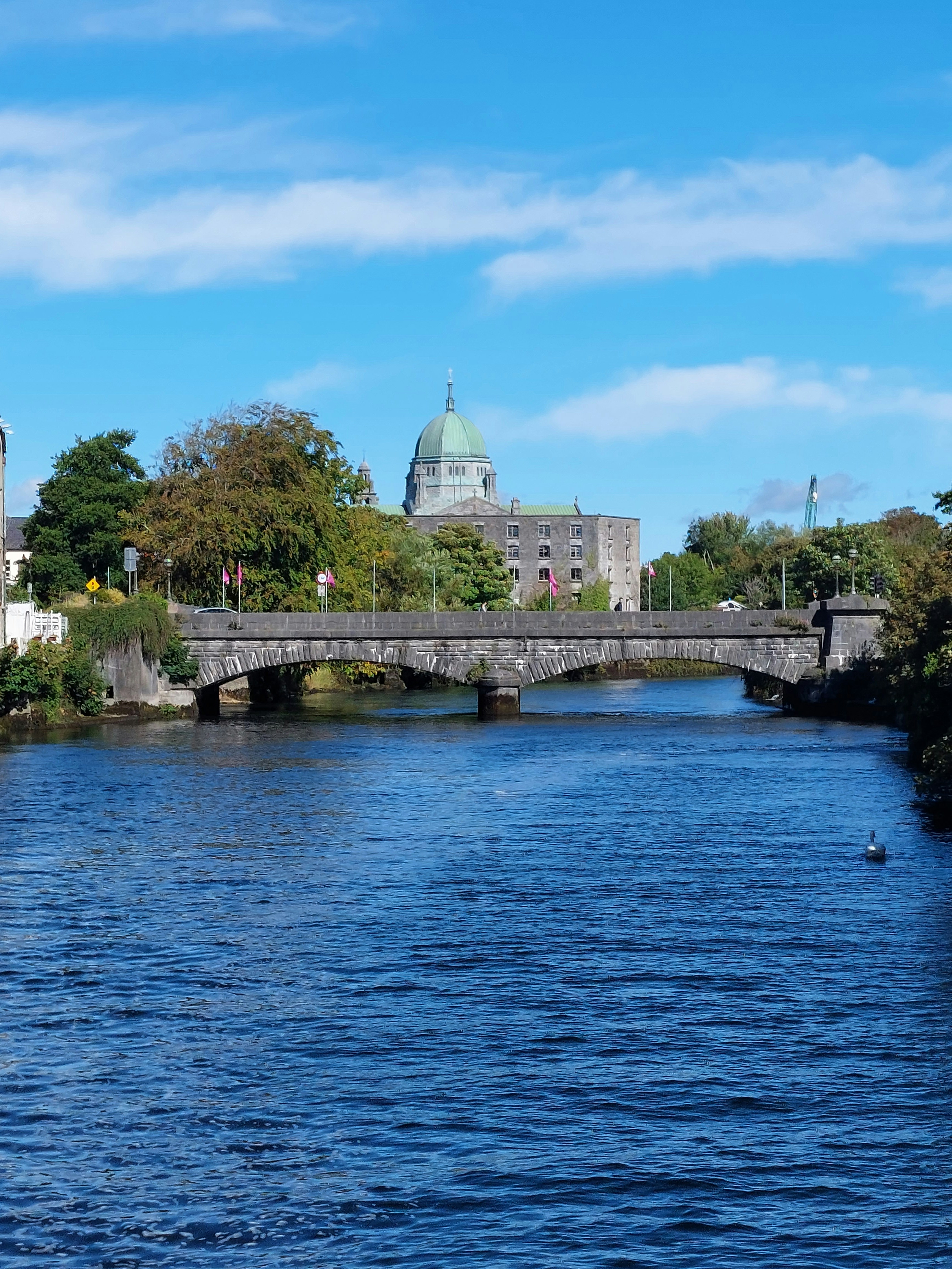 Dome and Bridge: Cityscape Over a Quiet River