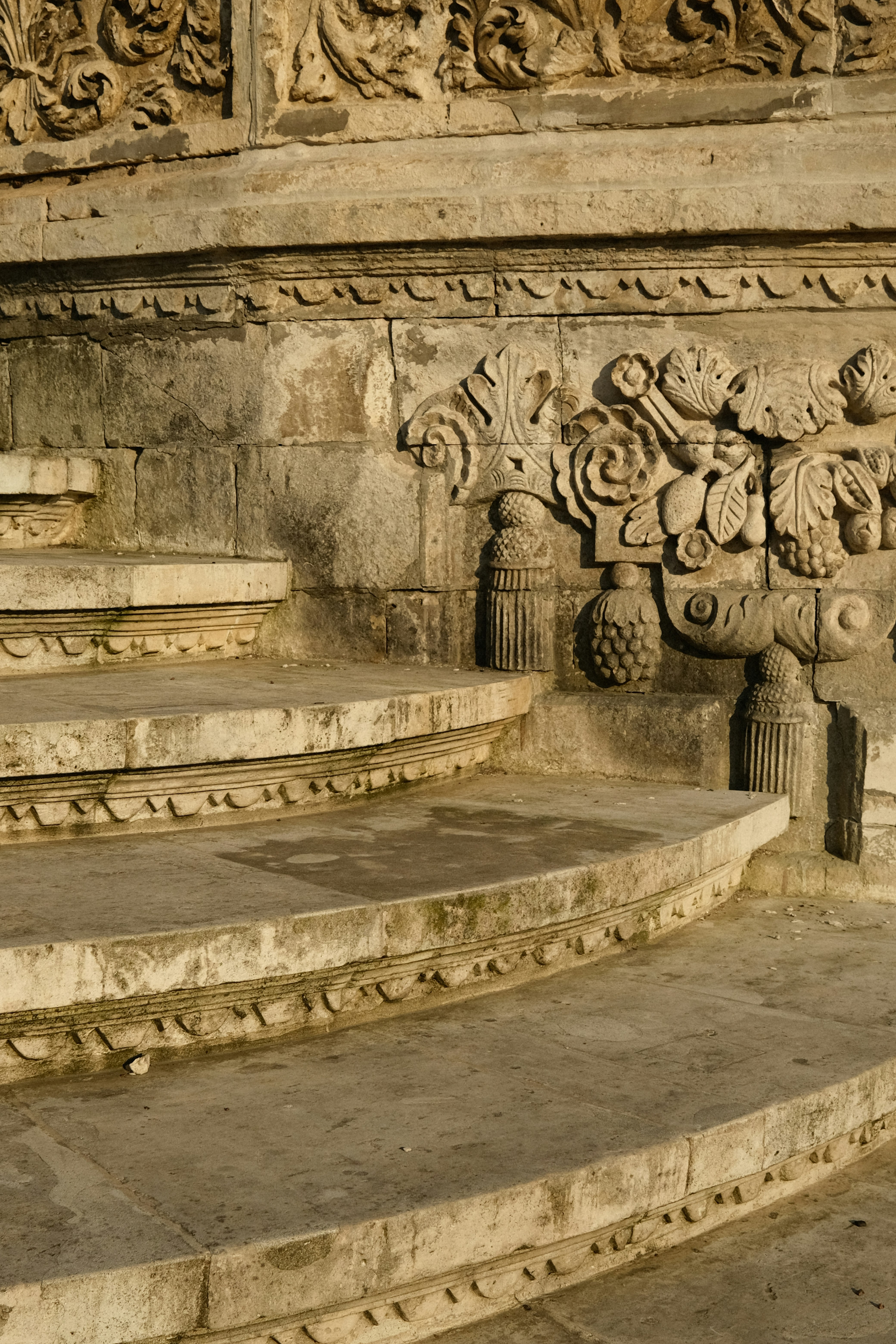 A set of stone steps leading up to a building photo – Free Archaeology ...