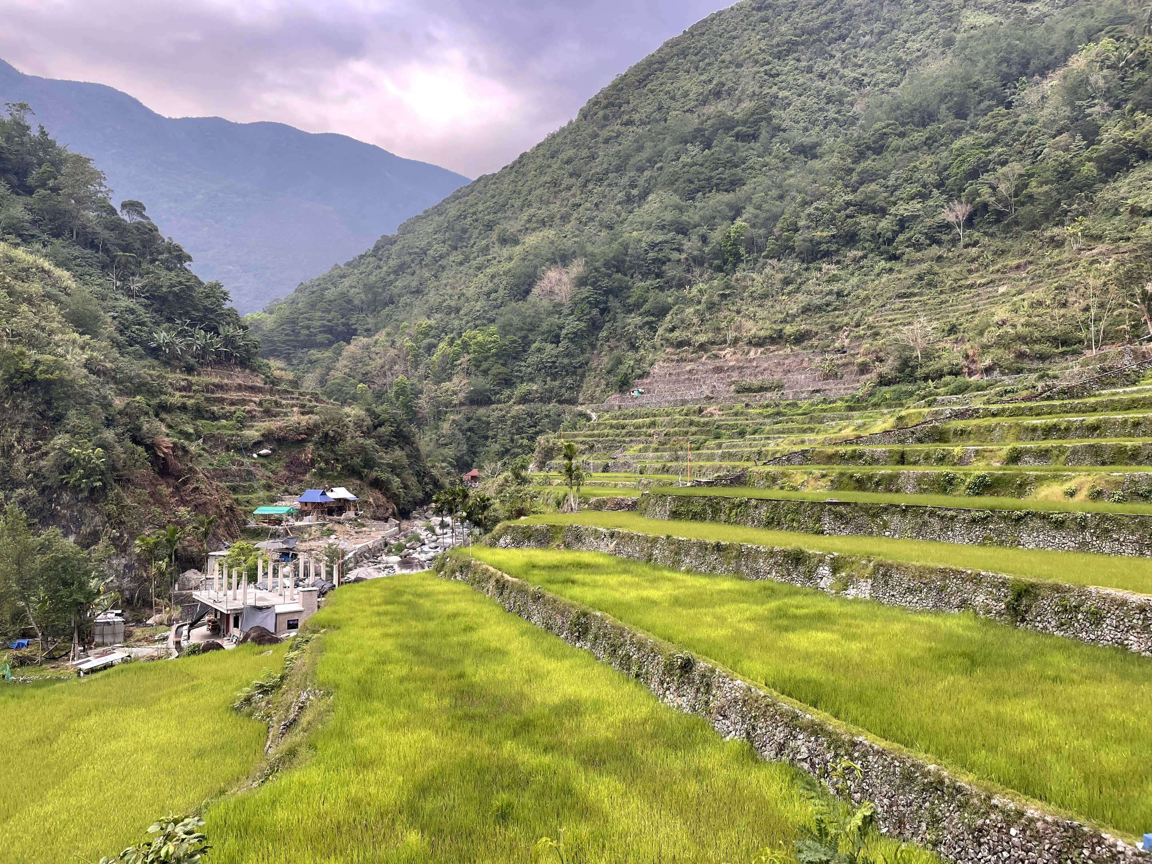 A lush green valley surrounded by mountains photo – Free Philippines ...
