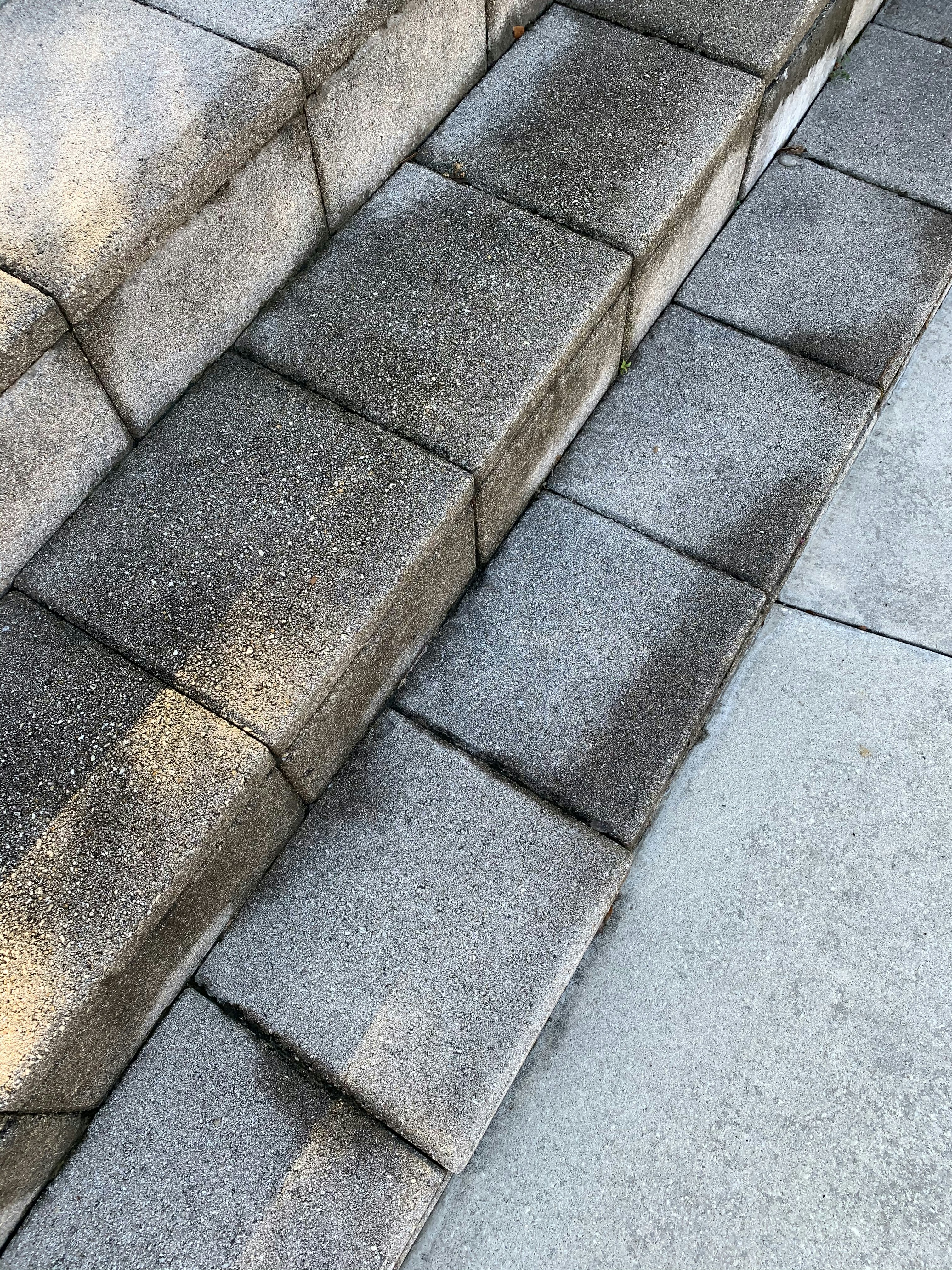 A close up of some steps made of cement photo – Free Lines and shapes ...