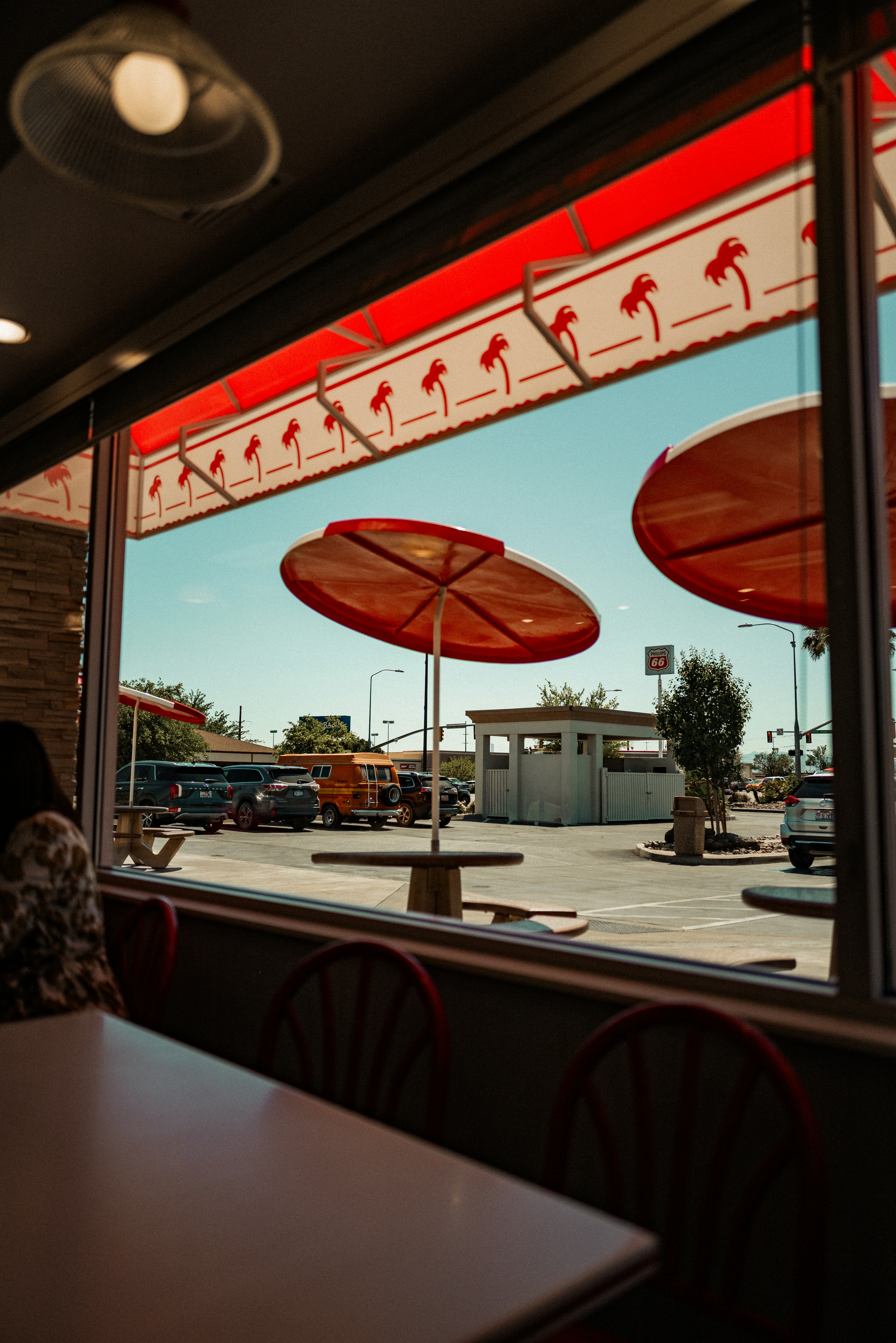 A view of a restaurant through a window photo – Free Burger Image on ...