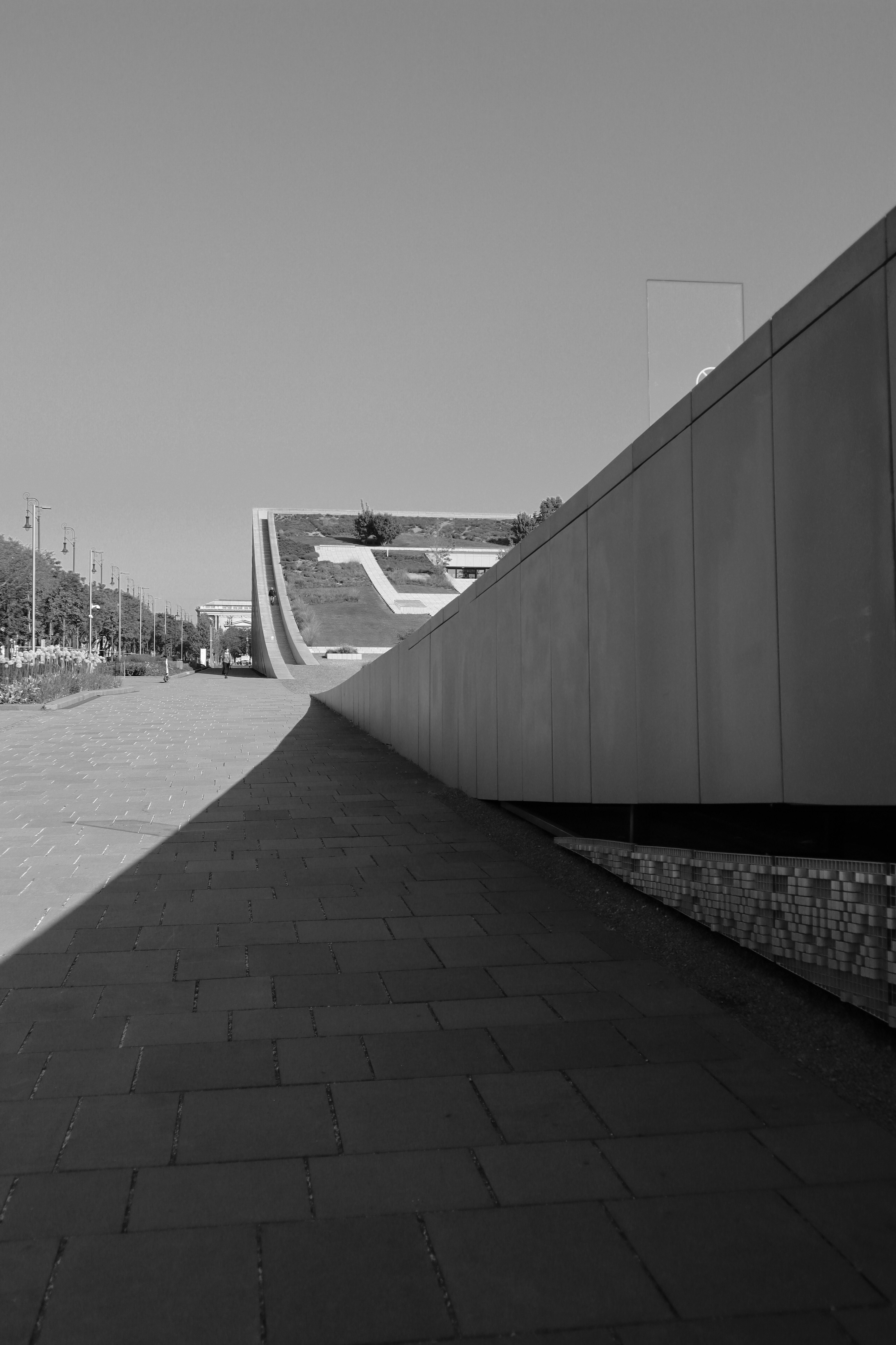 Converging Concrete: A Quiet Promenade Toward the Ramp
