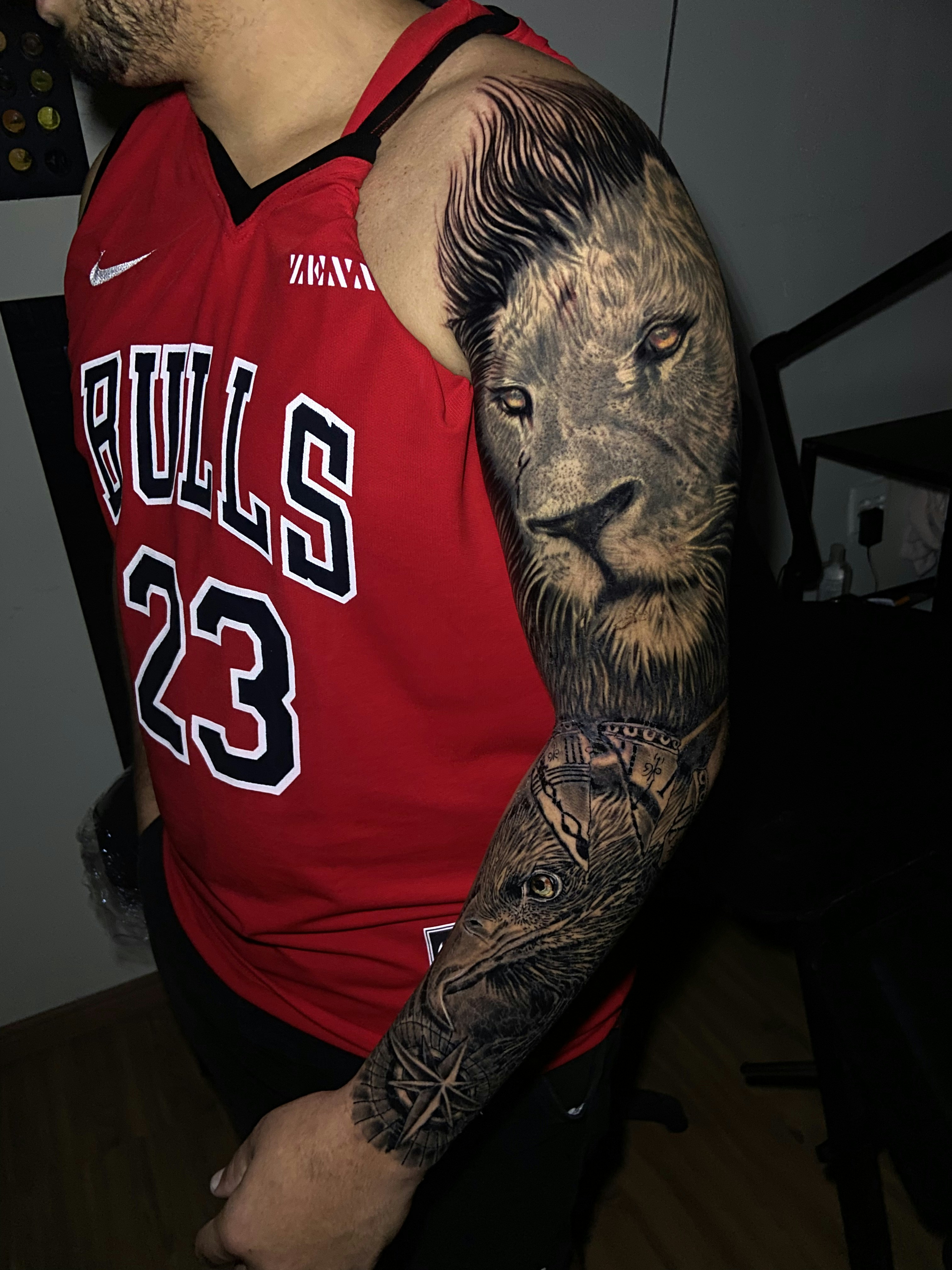 Row of Strength: A Bulls Player's Tattooed Arm in Focus