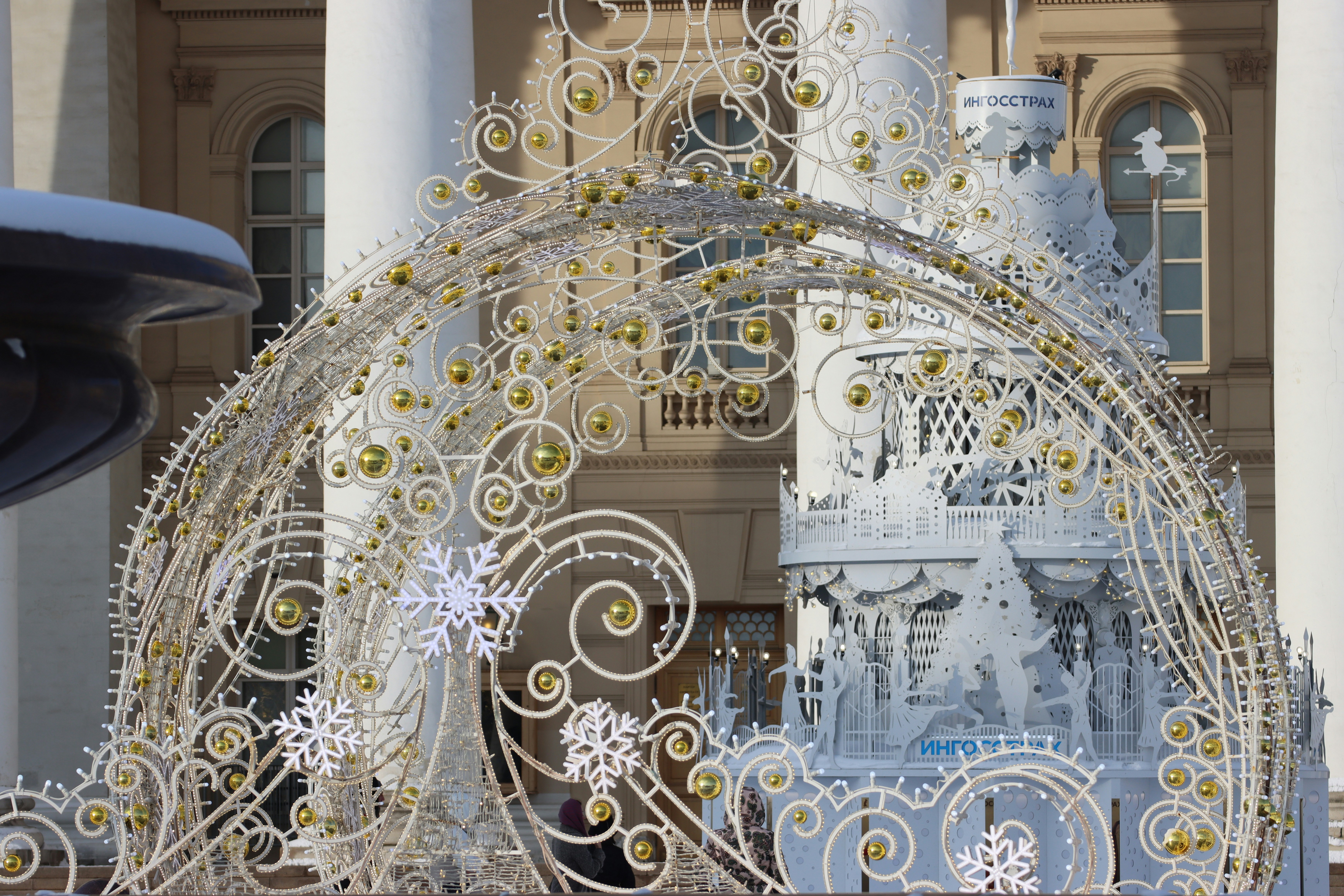 Swirling Snowflake Arch Framing a Neoclassical Facade