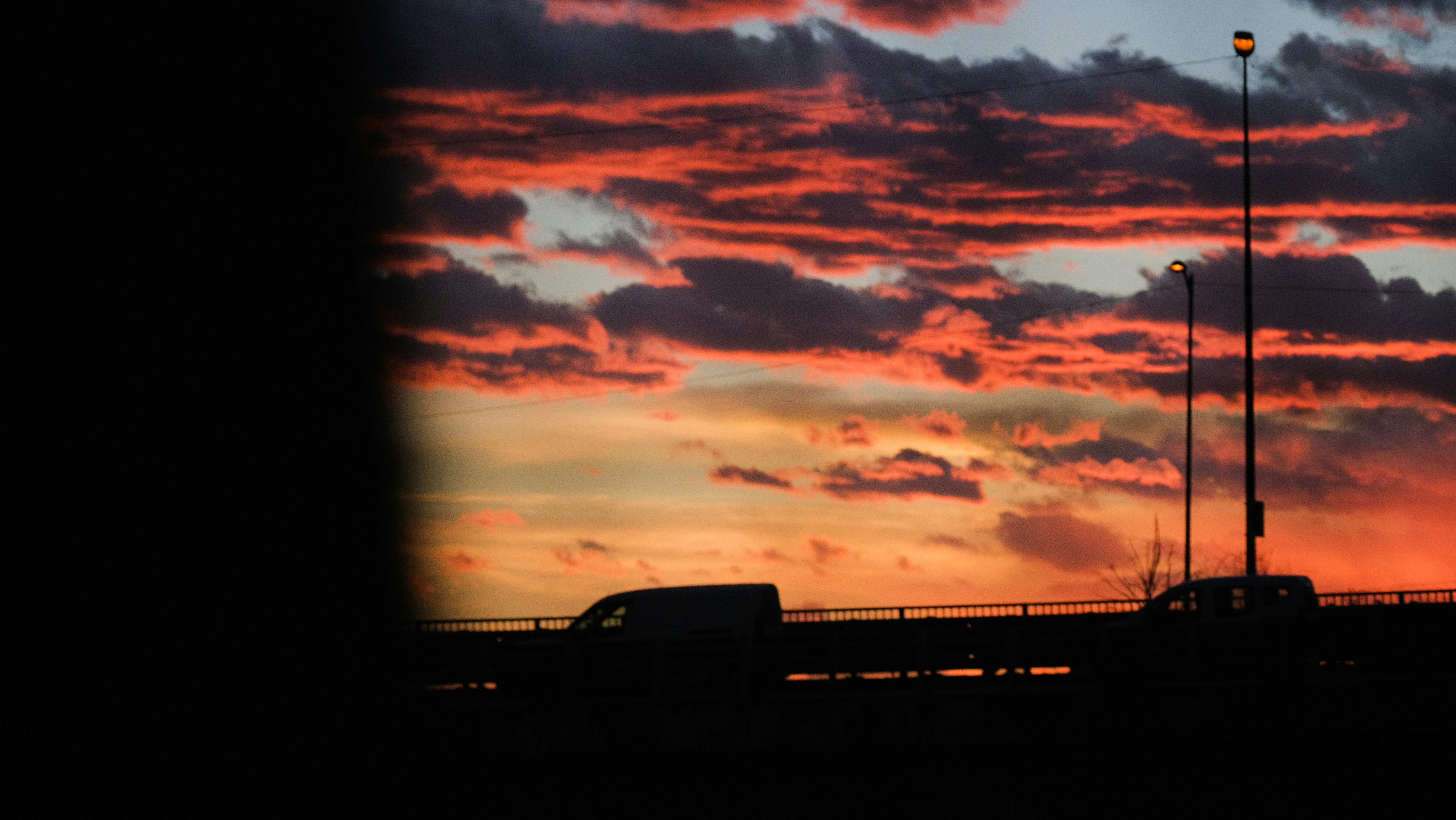 shooting orange cloudy landscape at sunset
