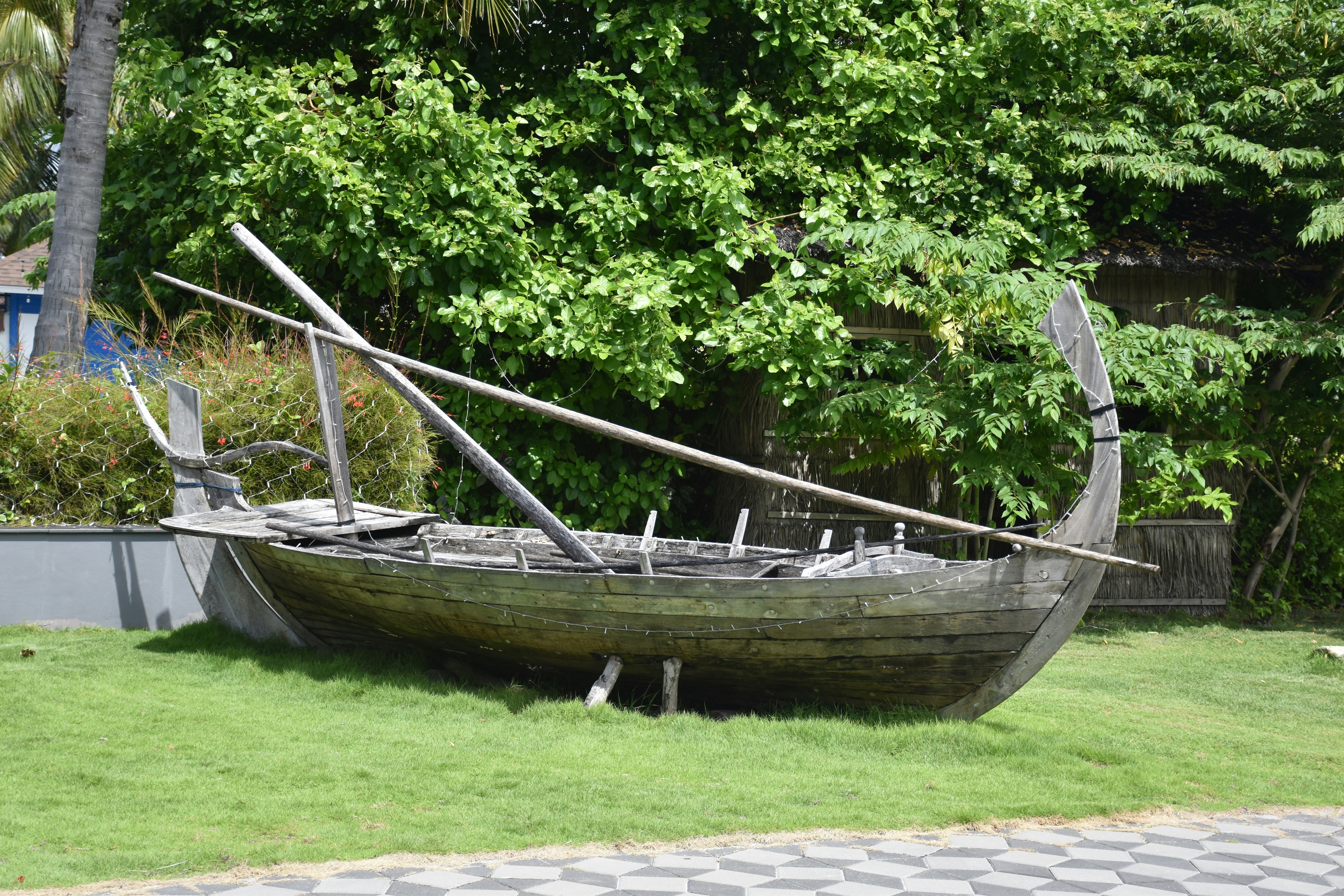 Weathered Vessel on a Green Stage