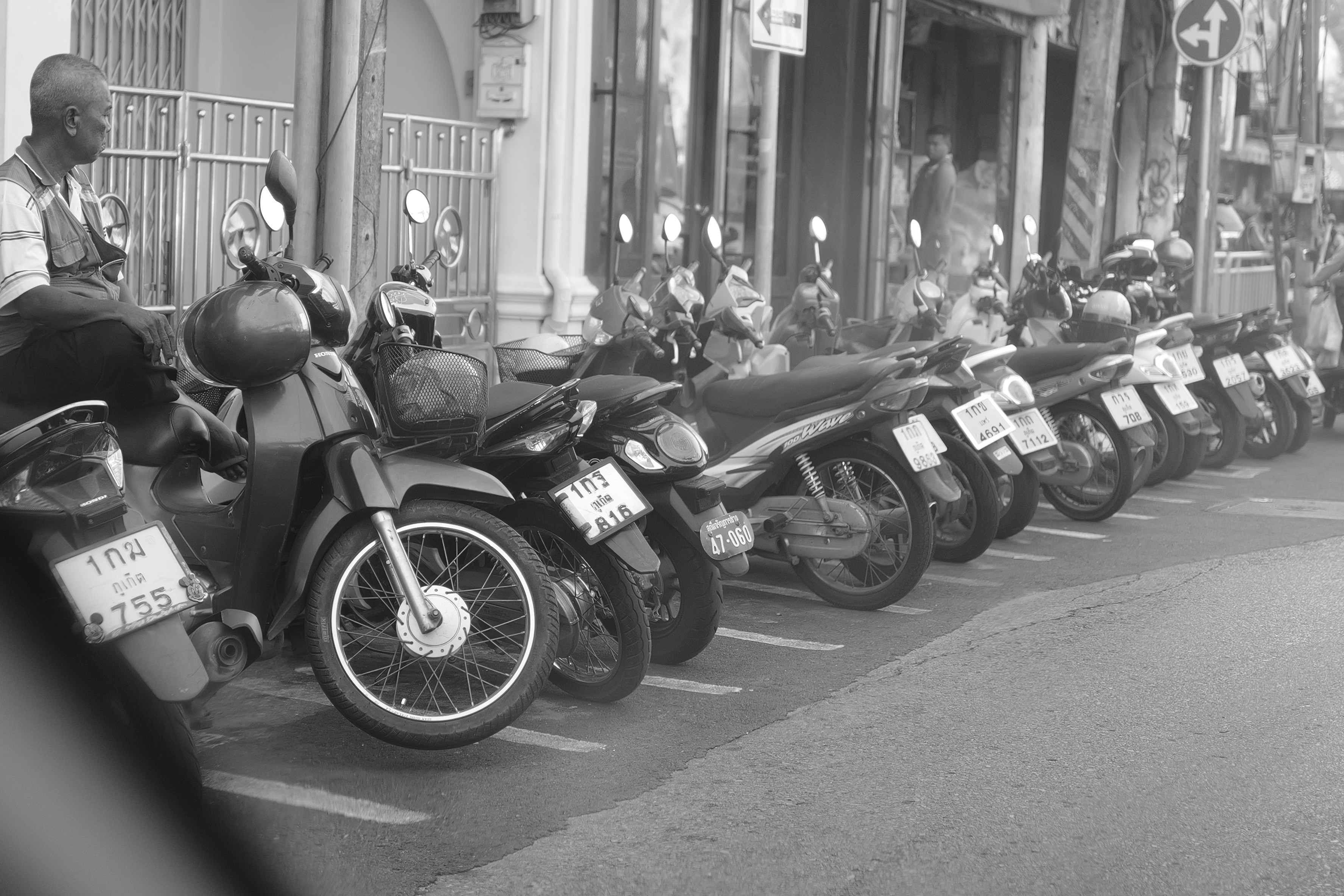 Chrome Row on a Quiet Street: A Grayscale Portrait of Urban Motorcycles