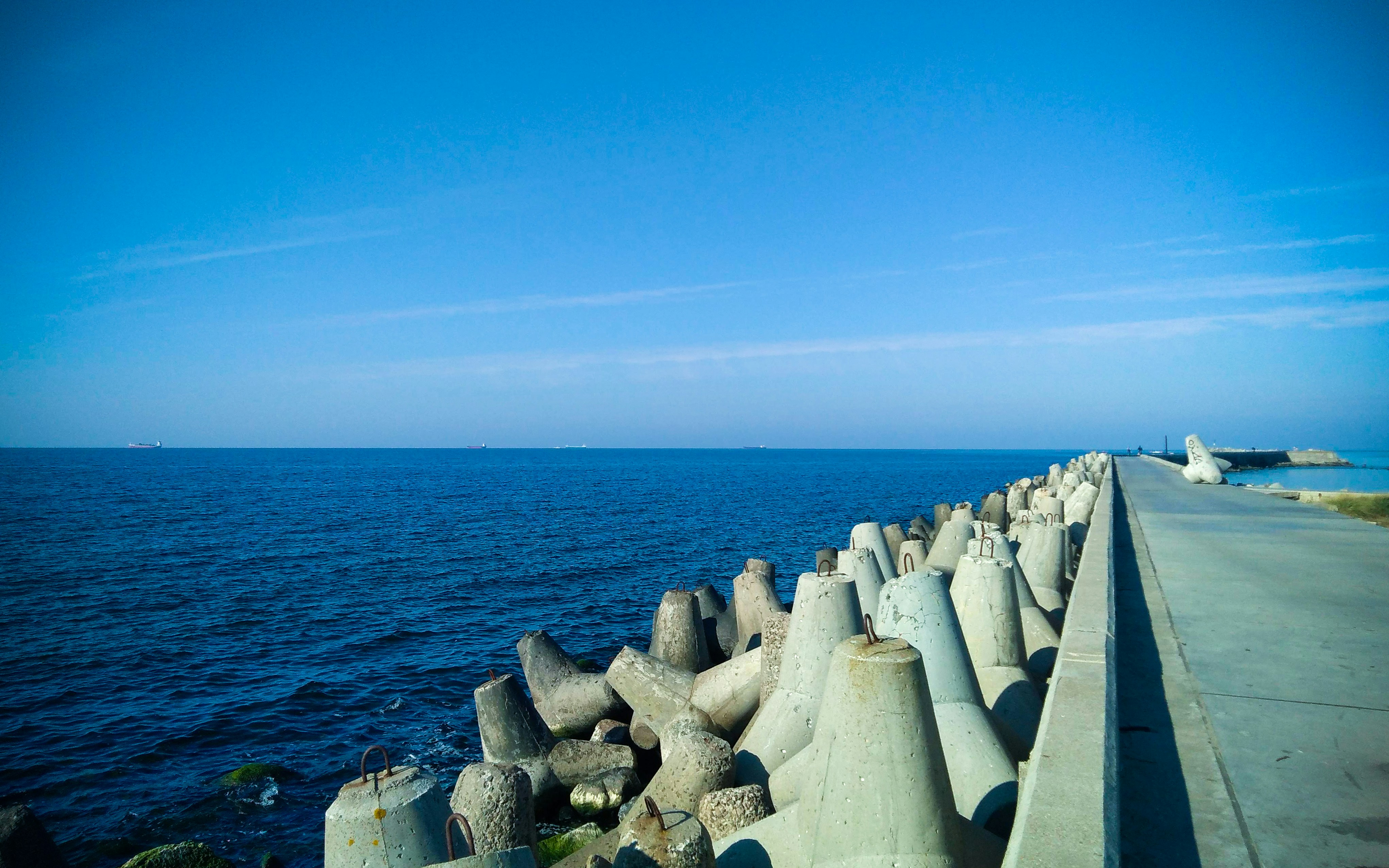 A view of the ocean from a concrete pier photo – Free Baltiysk Image on ...
