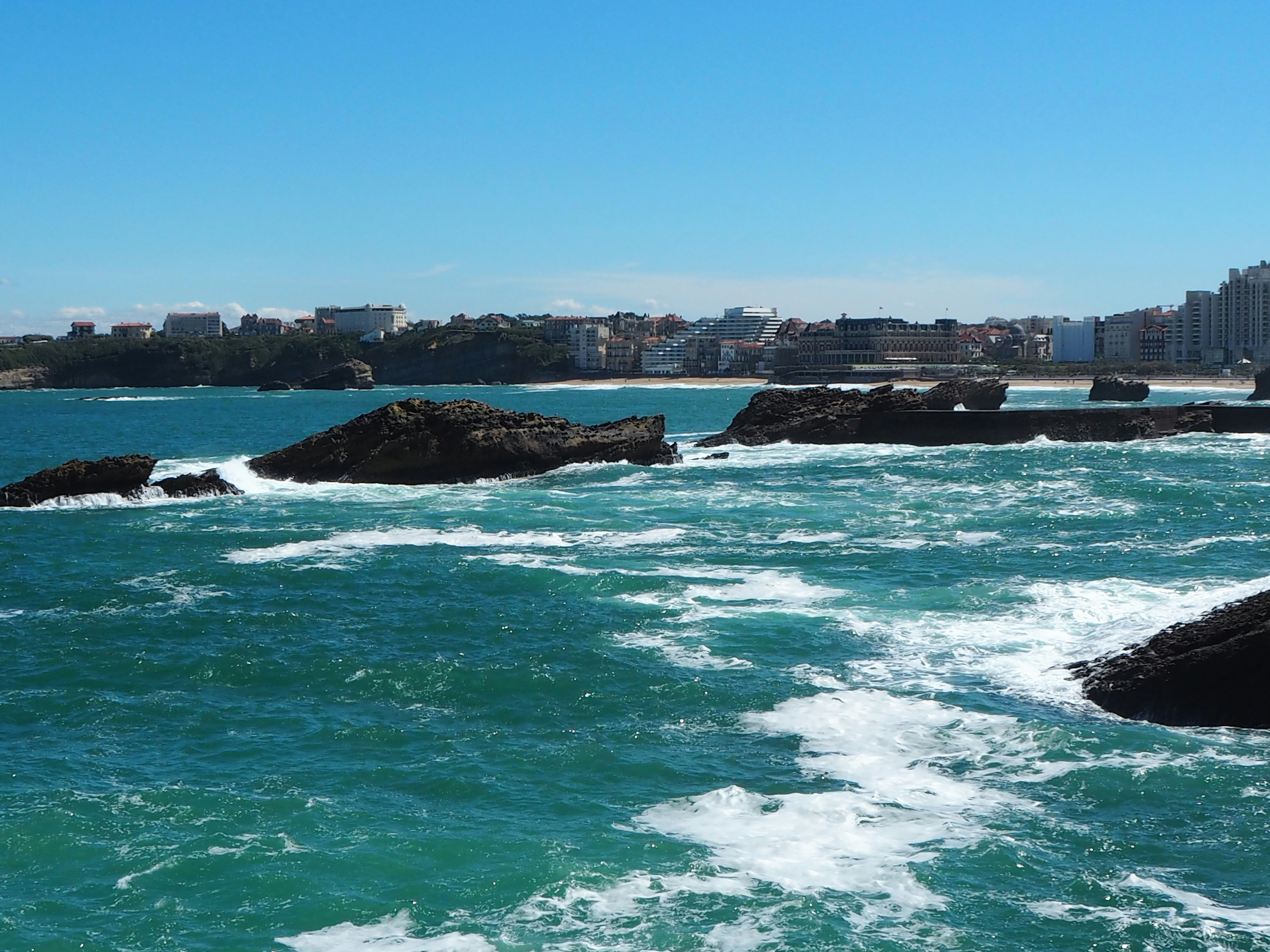 Coastal City Horizon: Waves Meet the Urban Line