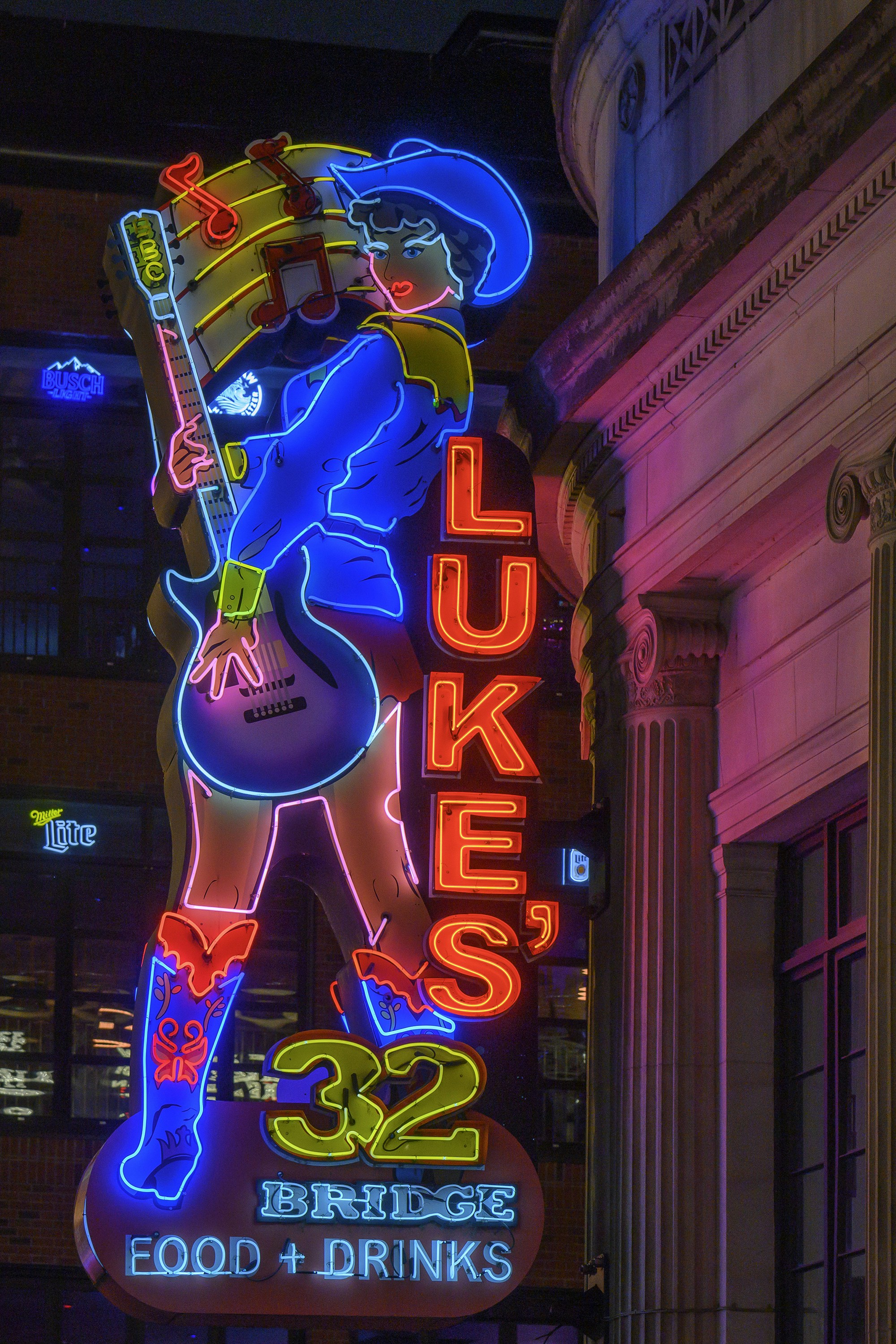 Neon Rockstar: A Night at Luke's 32 with Guitar-Glow