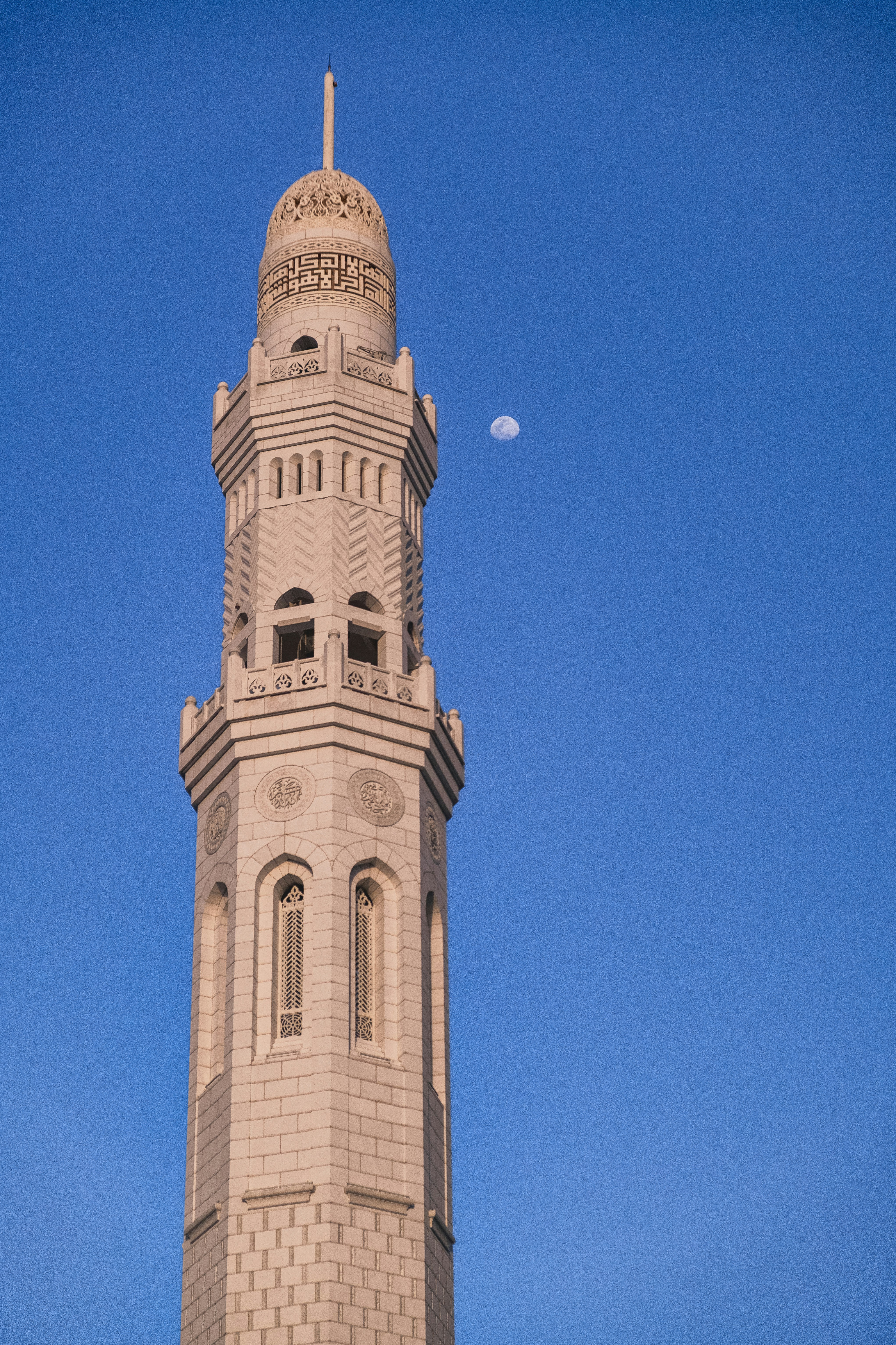 a tall tower with a clock on the top of it