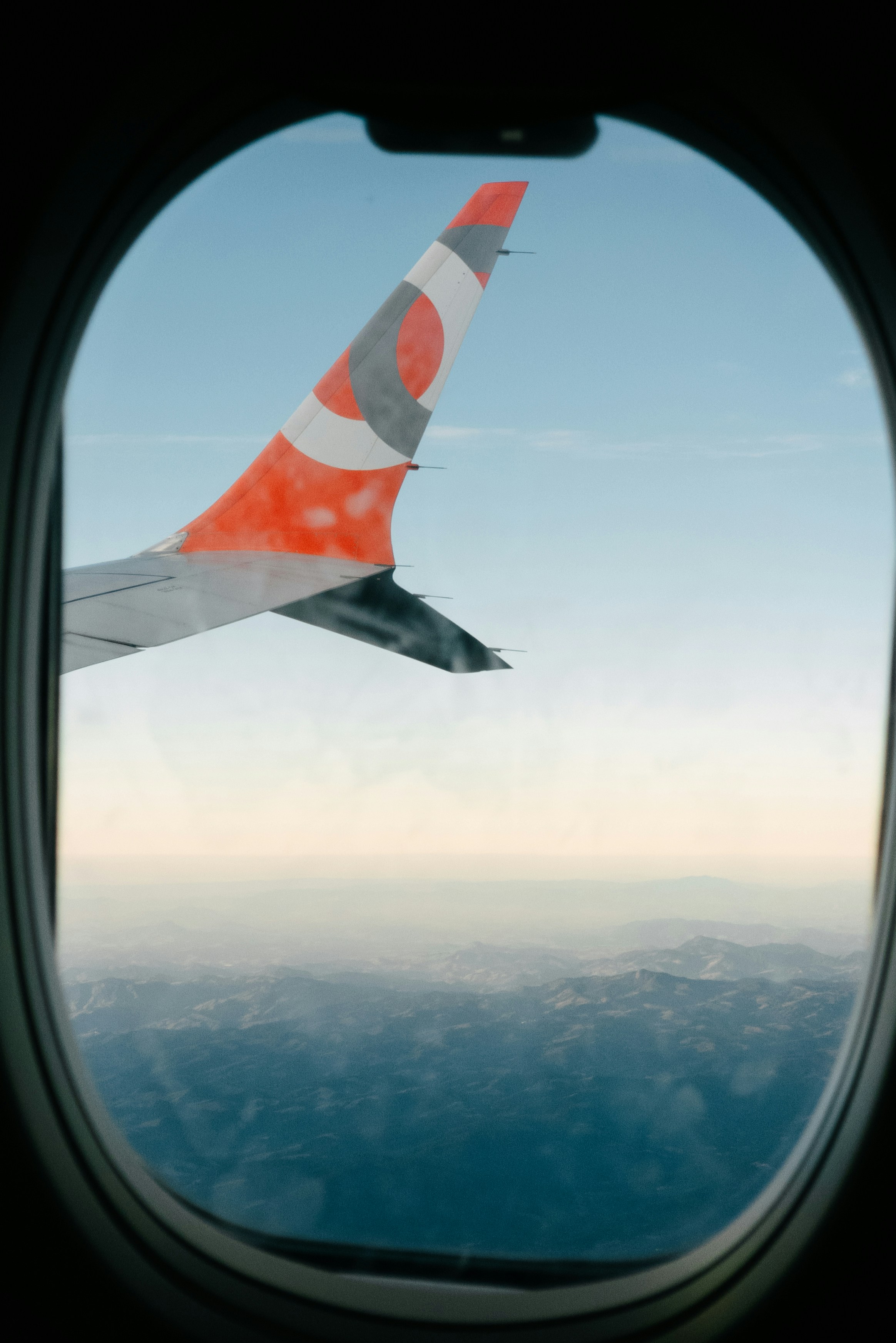 A view of the wing of an airplane through a window photo – Free Window ...