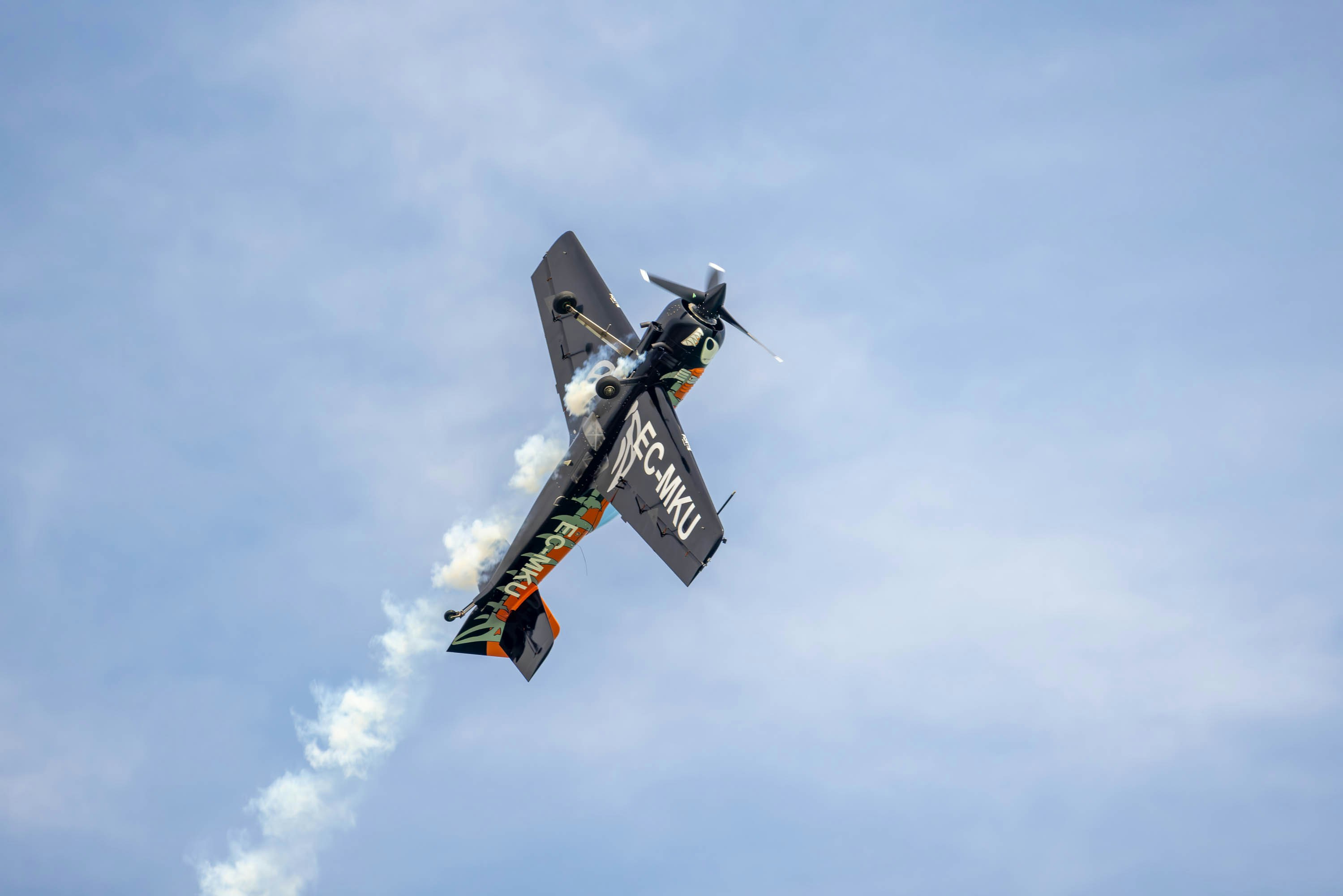 A small airplane flying through a blue sky photo – Free Caorle Image on ...