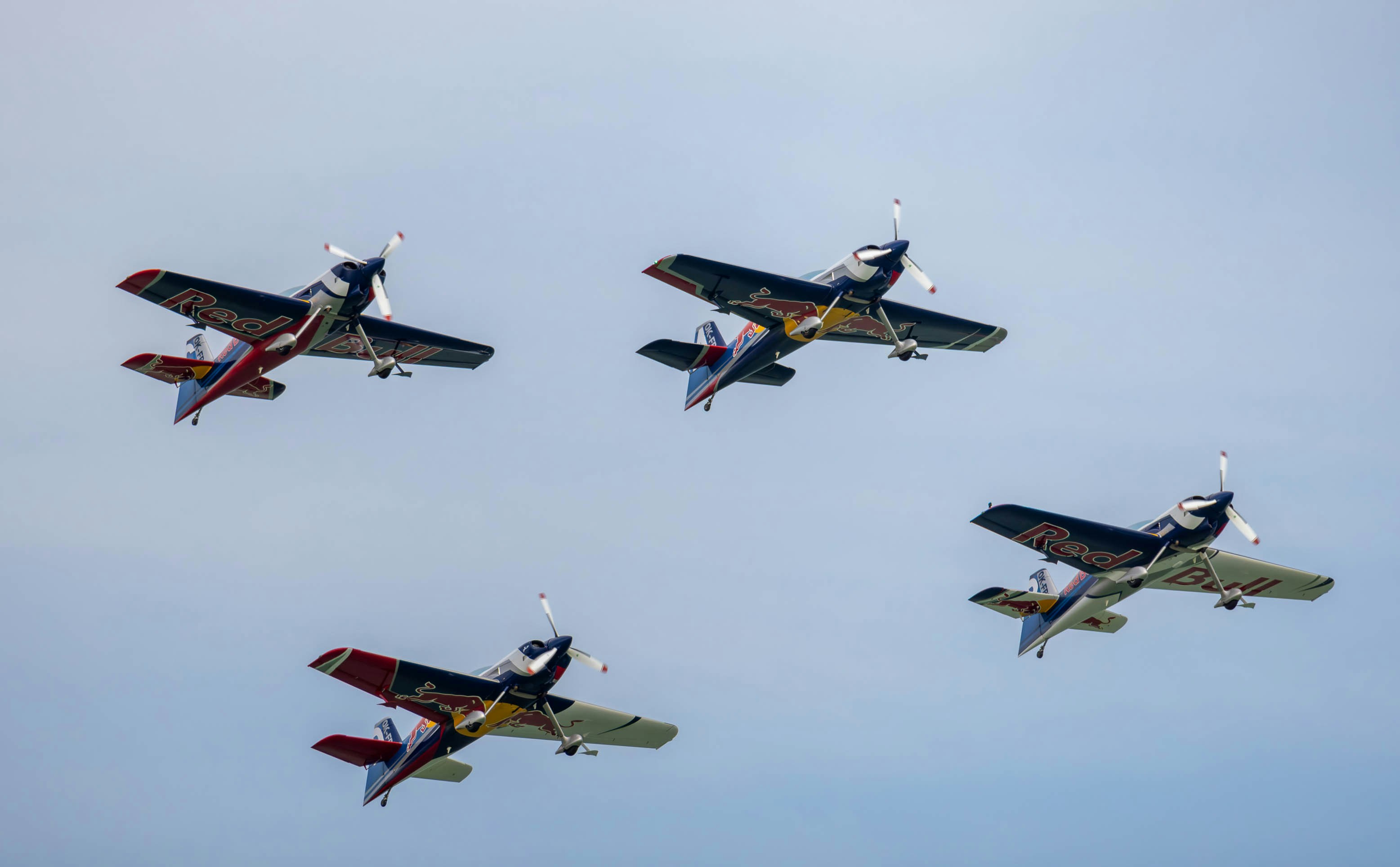A group of four planes flying in the sky photo – Free Caorle Image on ...