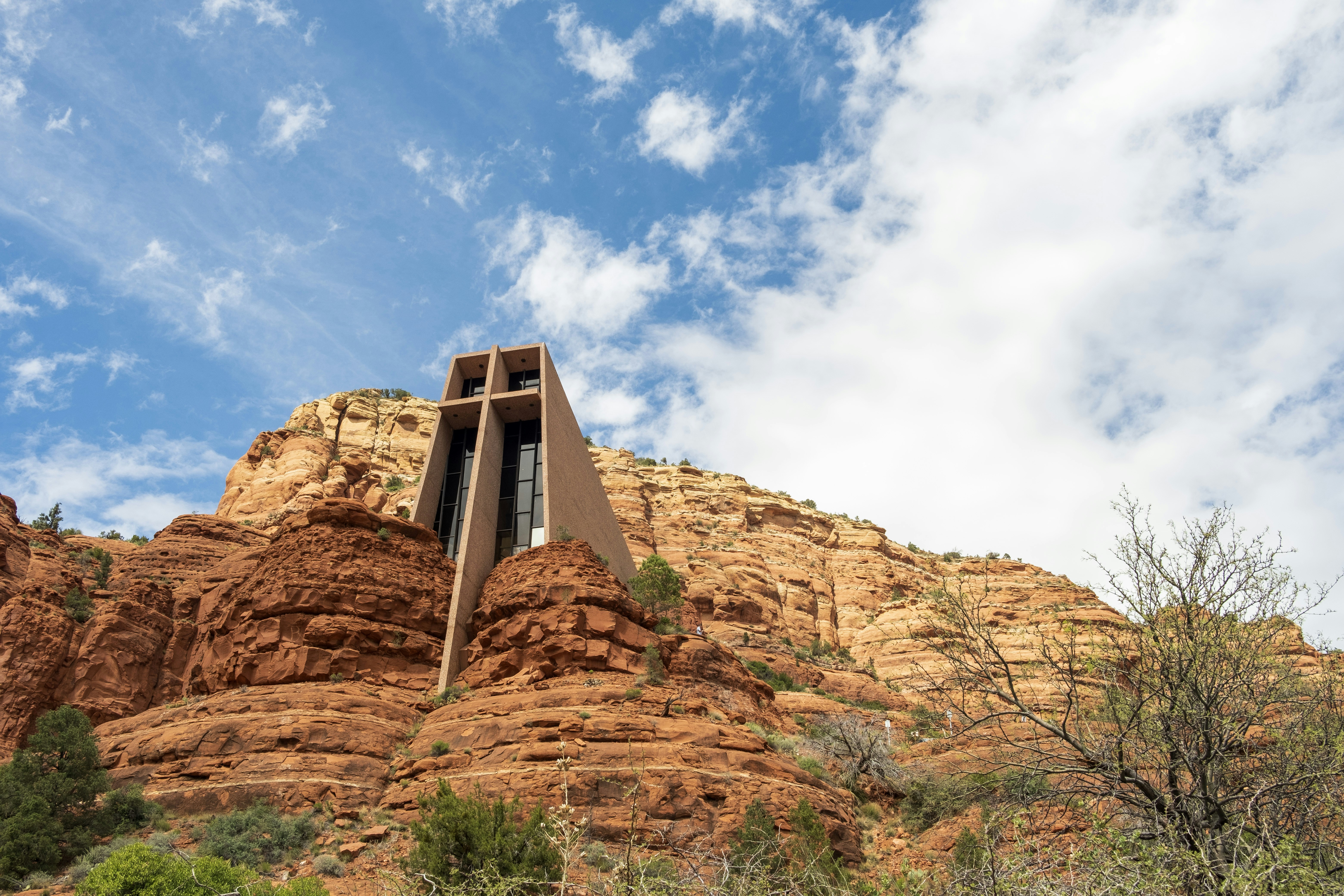 Stone Sentinel: A Monumental Shrine Rising from Desert Cliffs