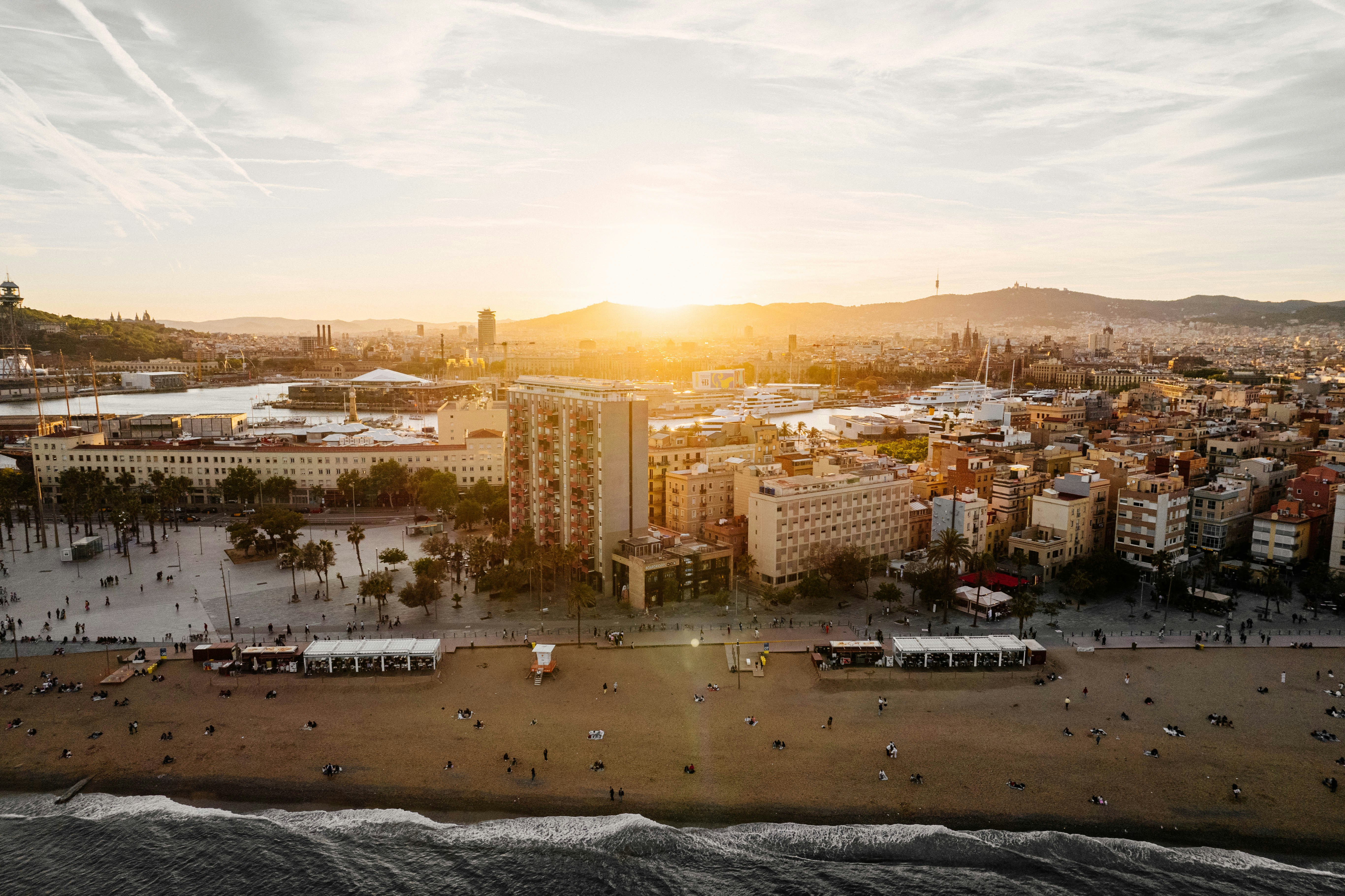 Golden Hour Over the Beachfront City: An Aerial Portrait of Skyline and Shore