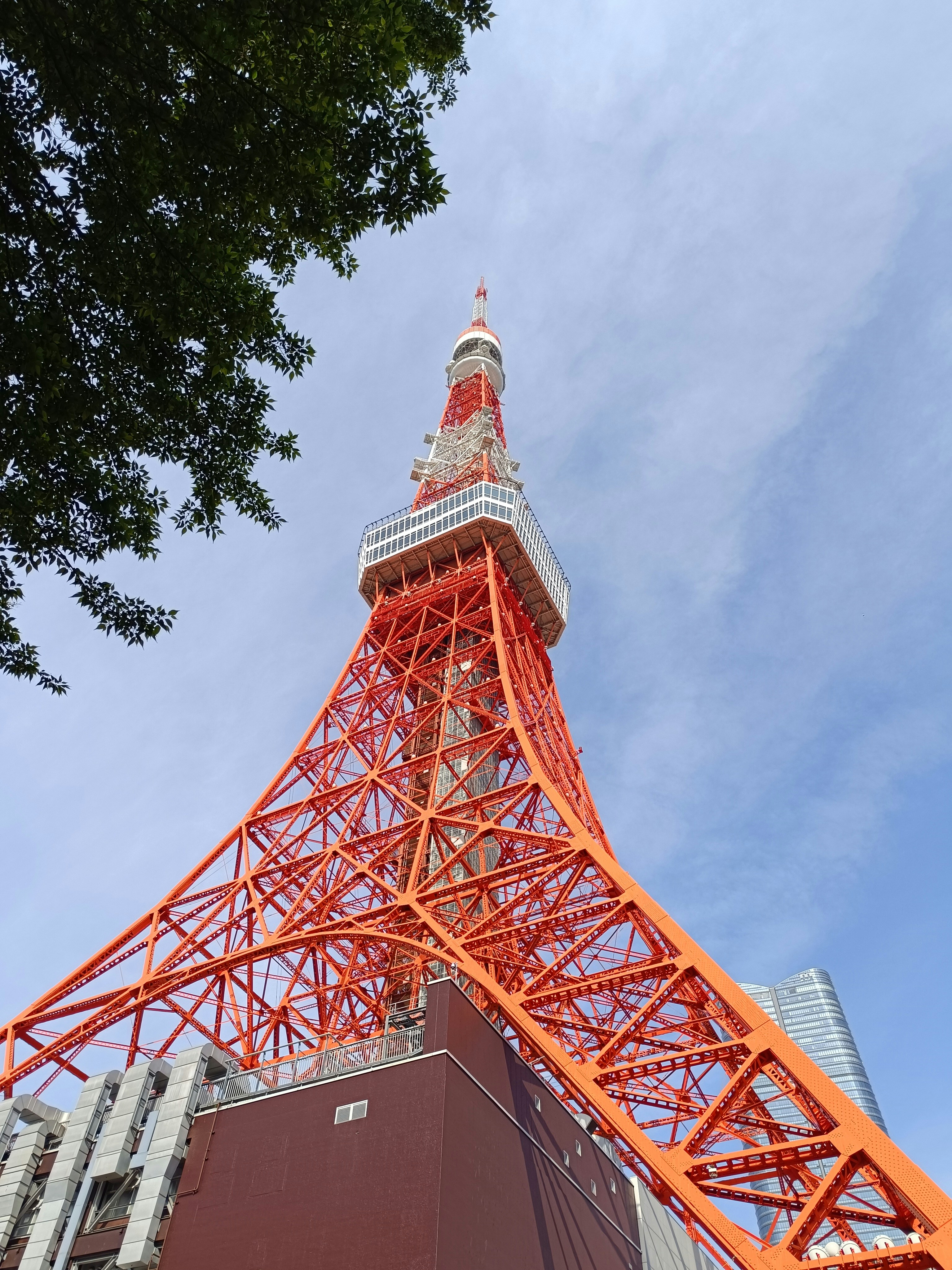 A tall orange tower with a sky background photo – Free Tokyo Image on ...