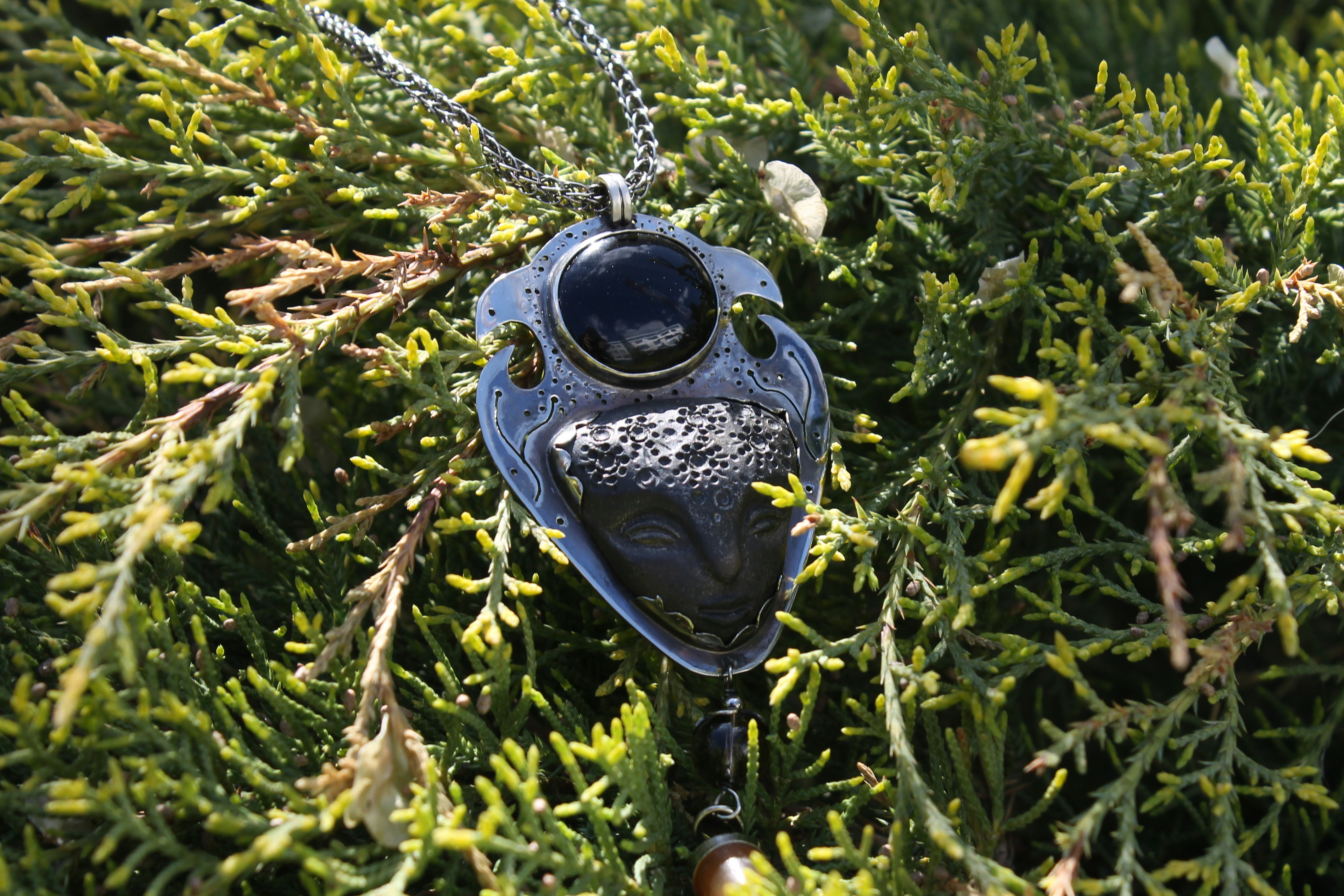 Lurking Locket in an Evergreen Thicket