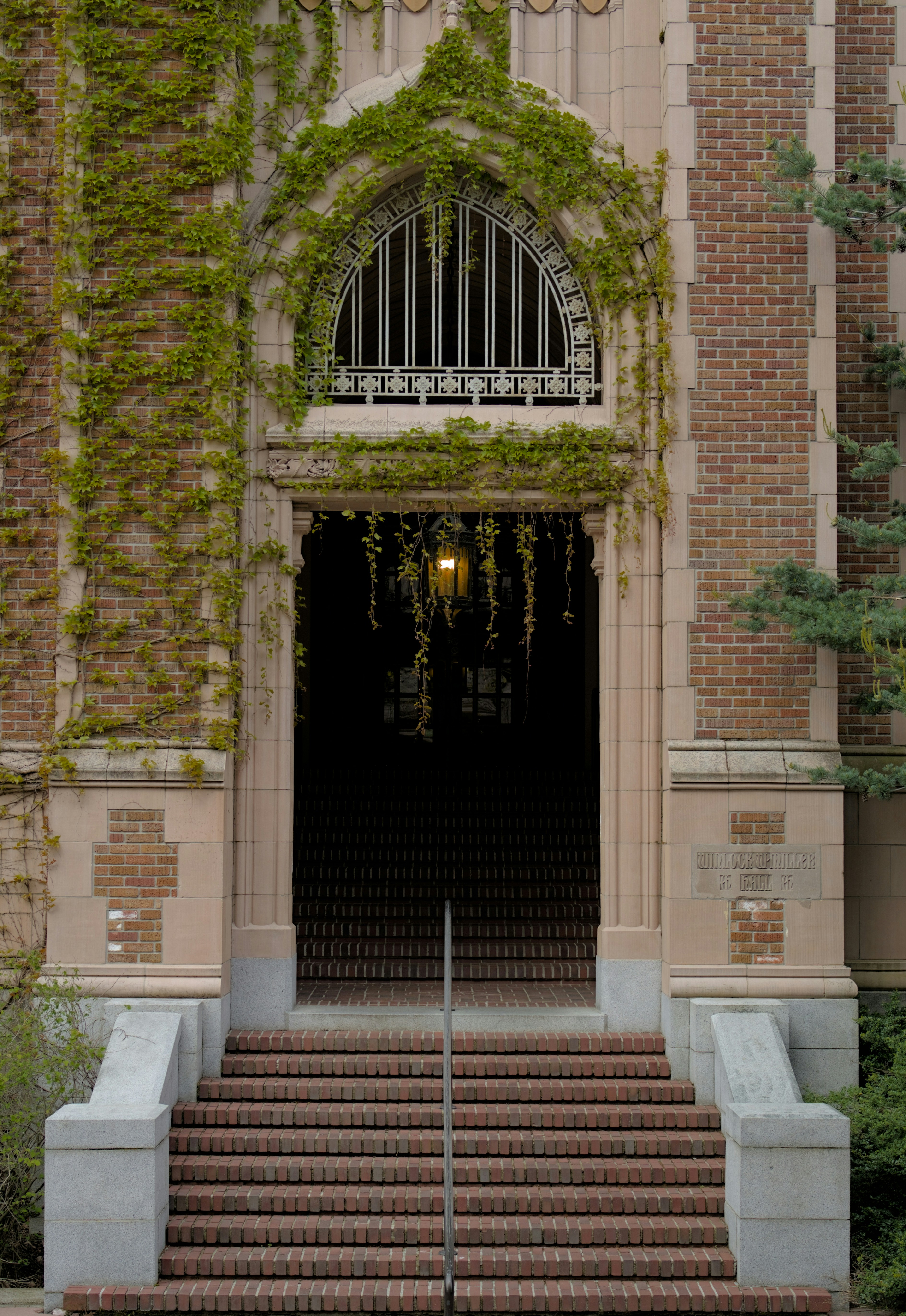 A very tall building with a bunch of stairs in front of it photo – Free ...