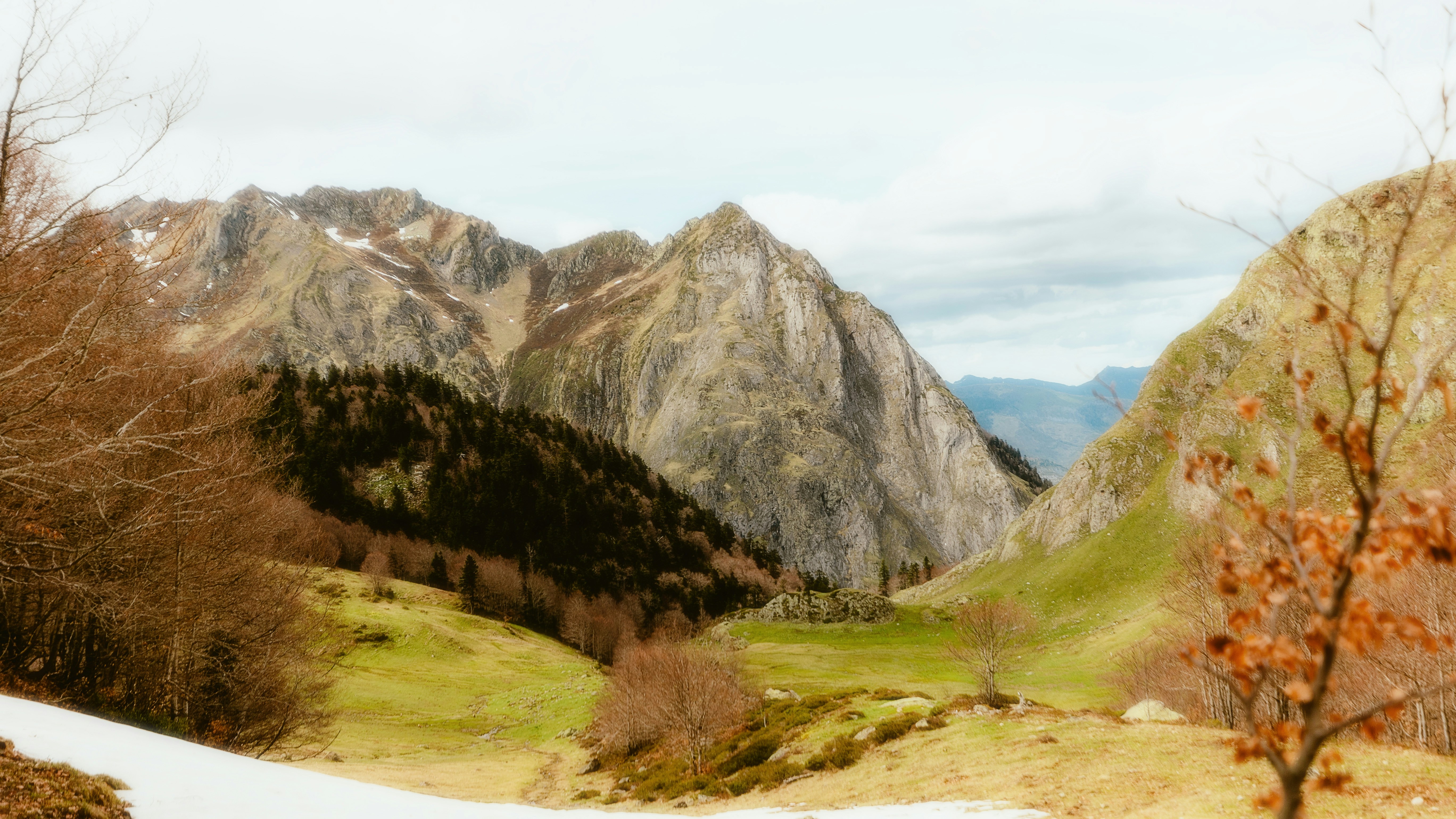 Emerald Valleys Beneath Rugged Peaks