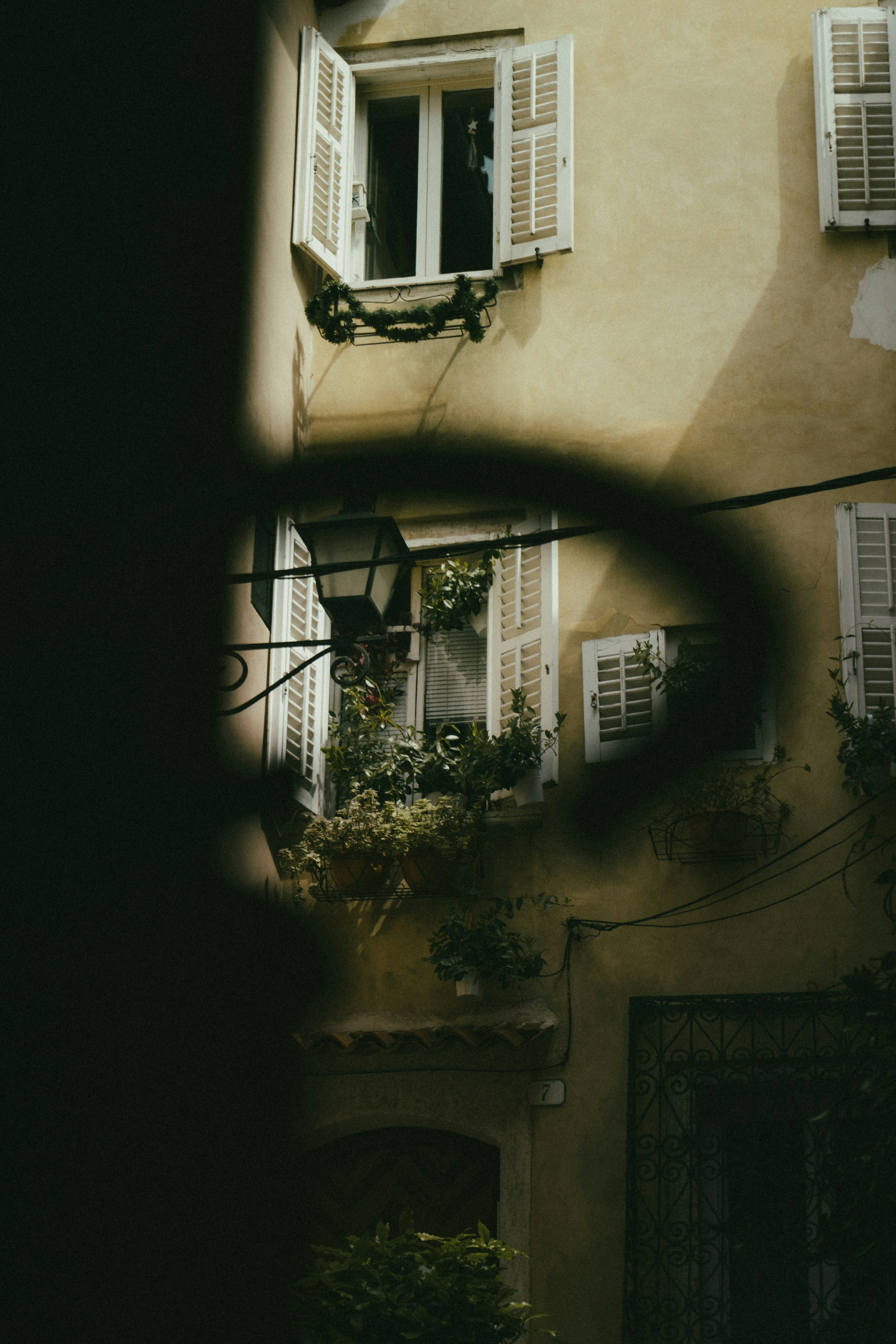 A view of a building through a window photo – Free Croatia Image on ...