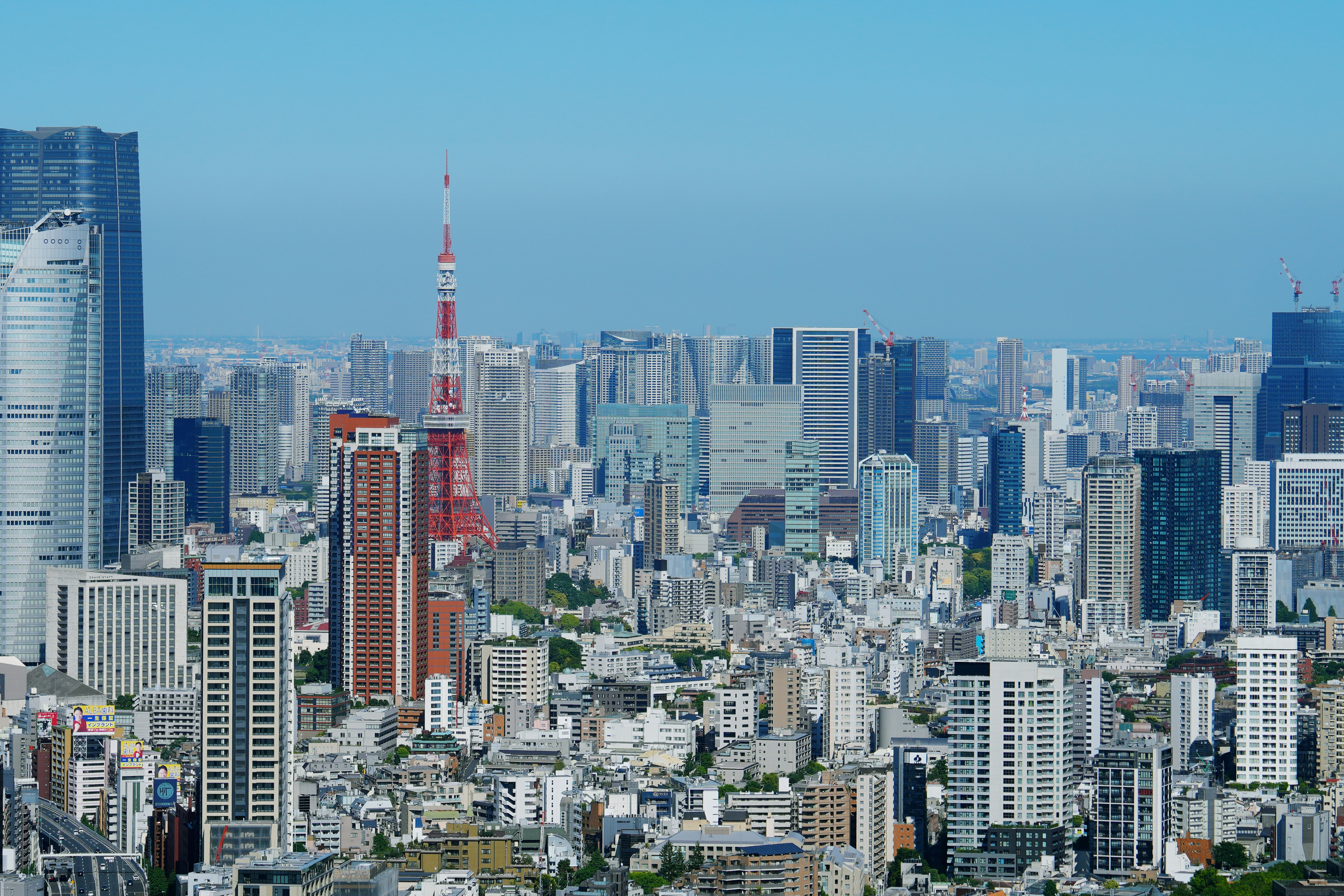 A view of a city with tall buildings photo – Free Building Image on ...