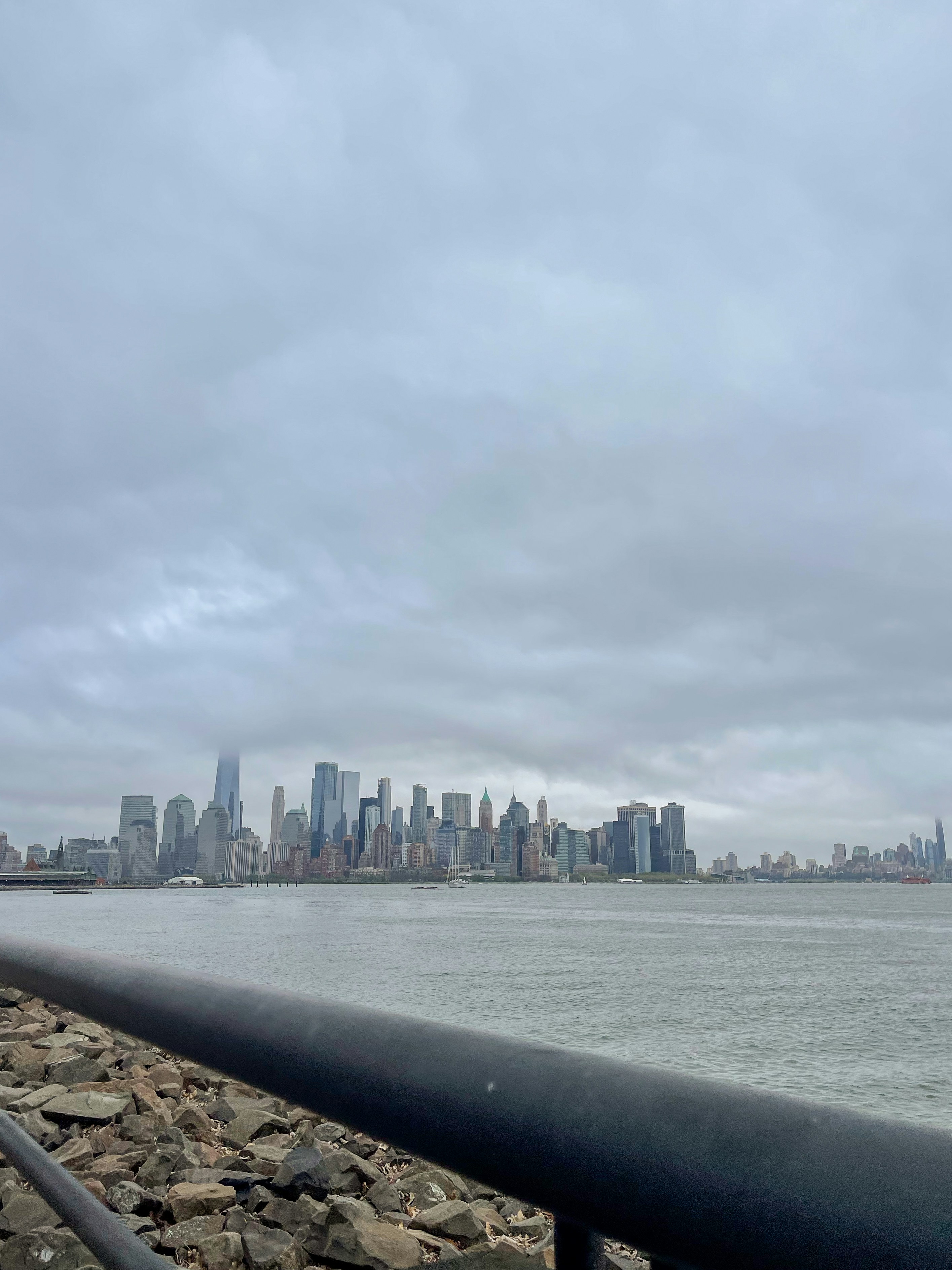 Ribbed Waterfront Overlook toward a Distant Skyline
