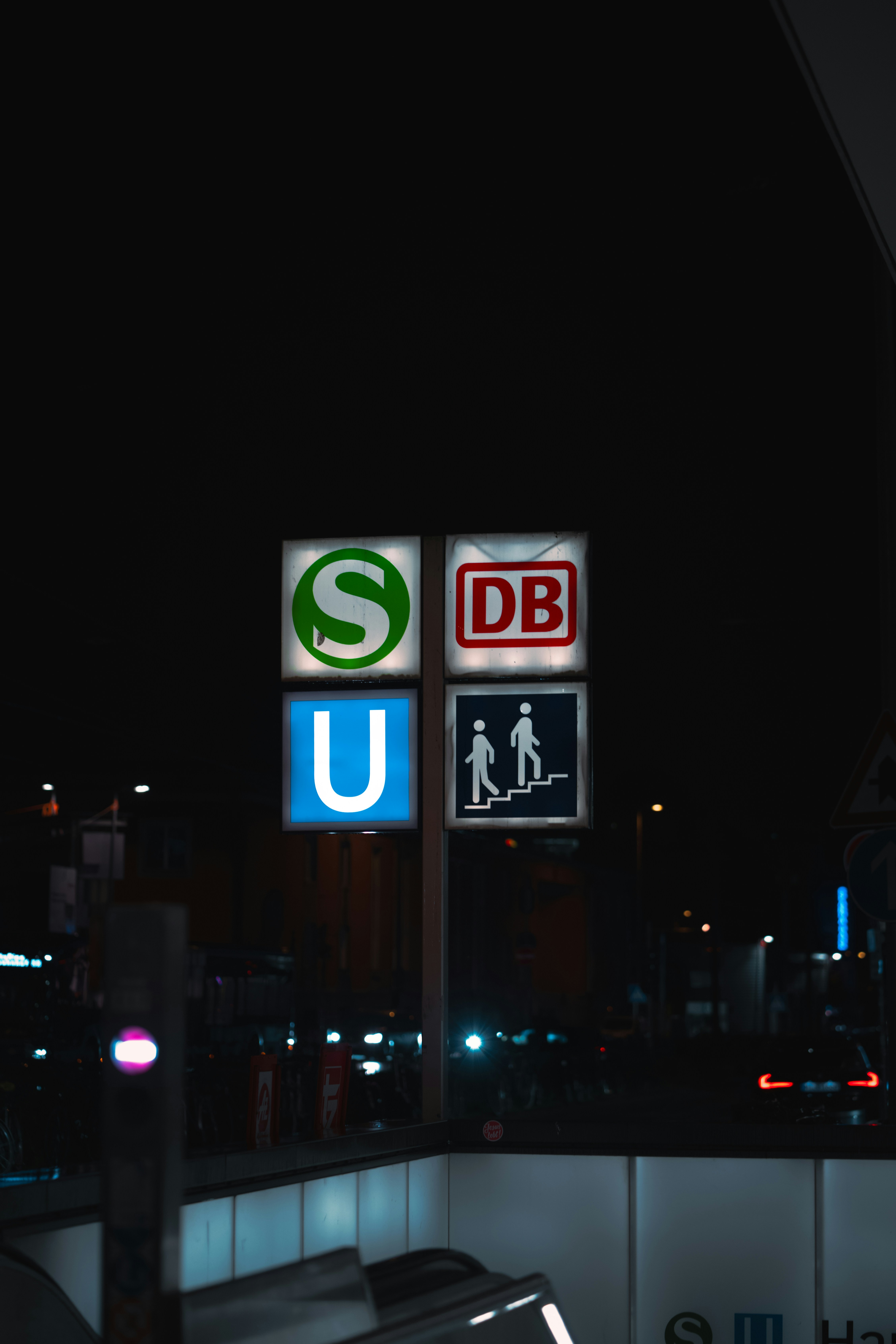 A parking lot at night with a lighted sign photo – Free Sony a7 iv ...
