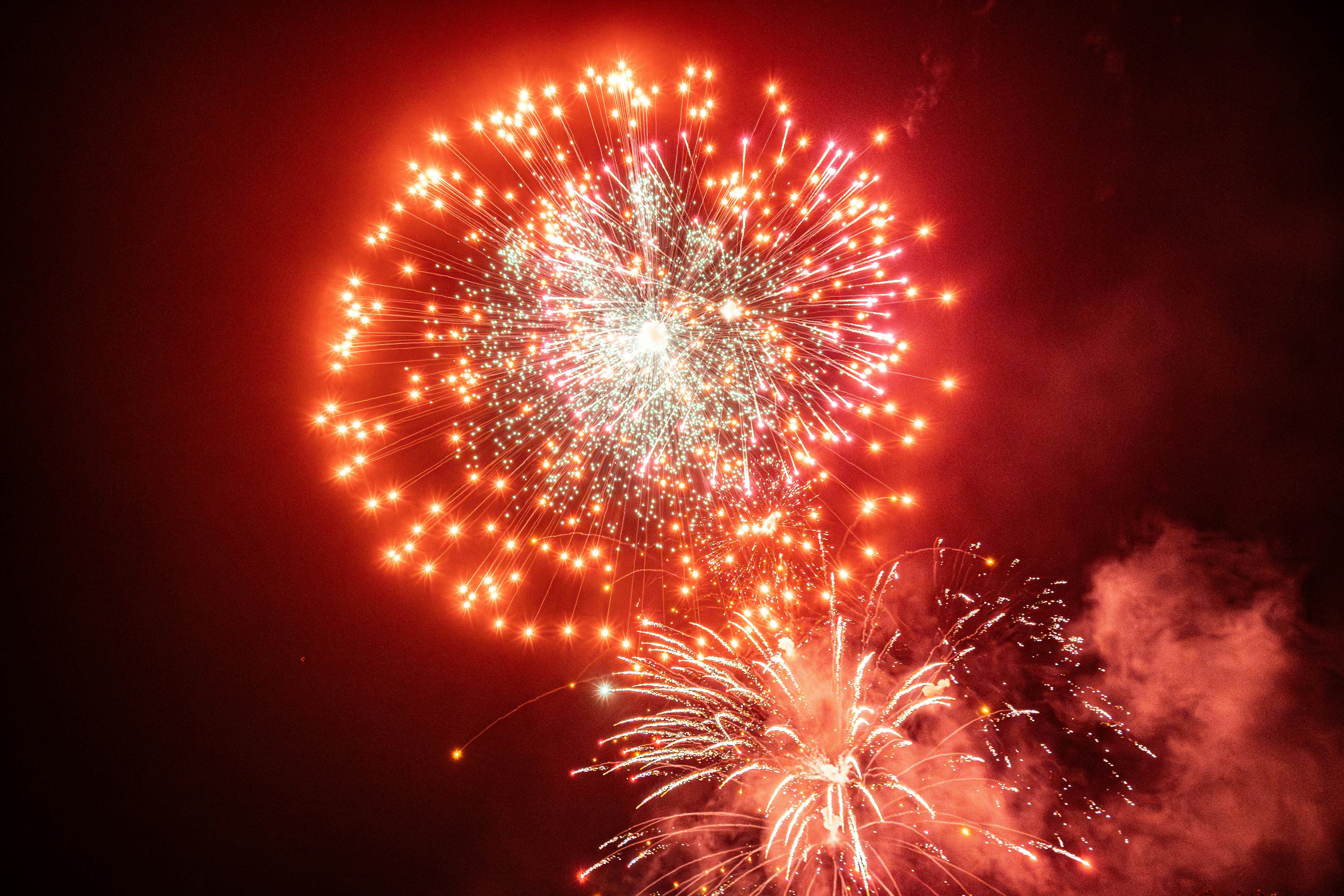 A firework display in the night sky photo – Free Fireworks Image on ...