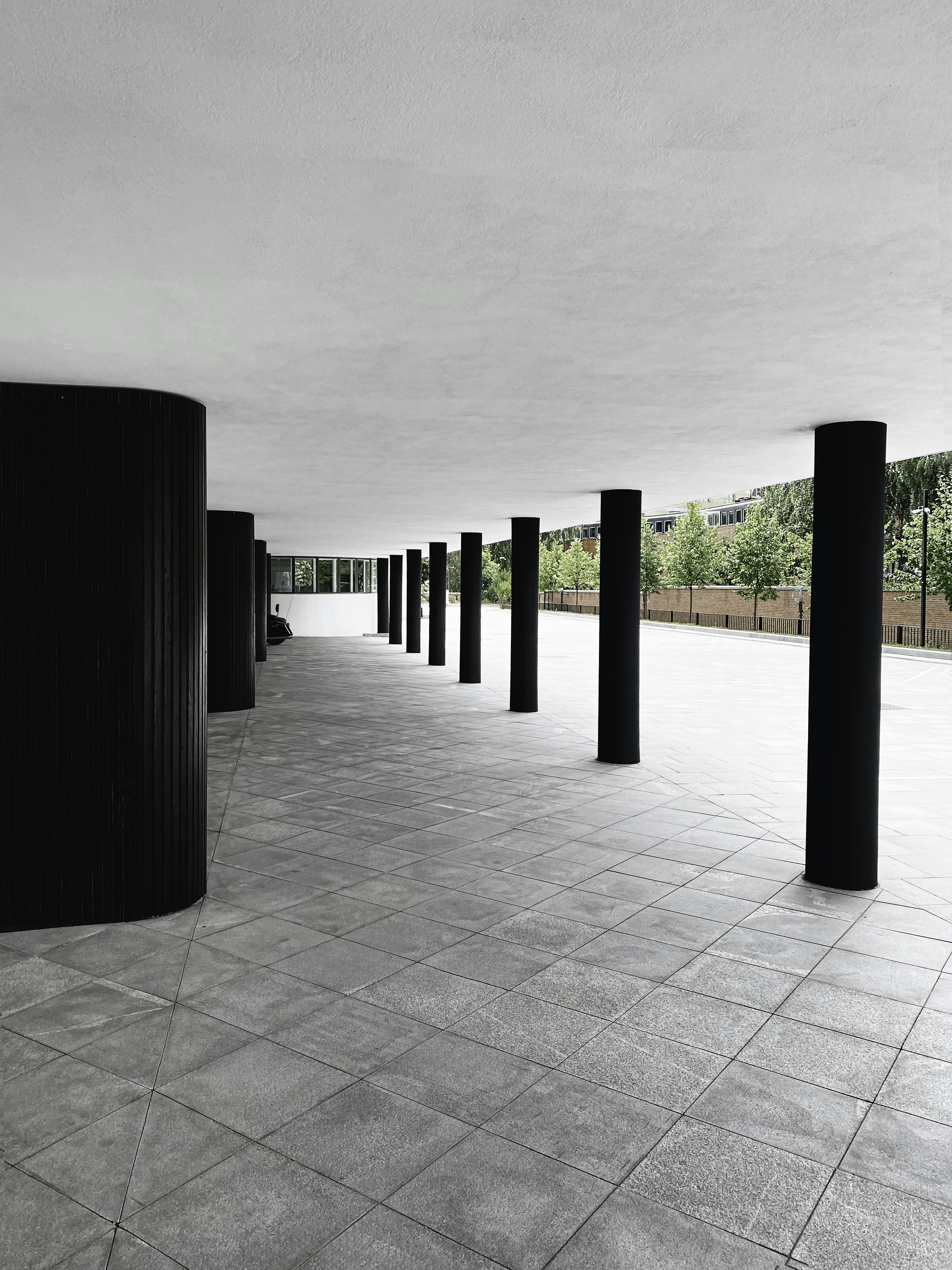 Receding Pillars: A Monochrome Corridor of Quiet Geometry